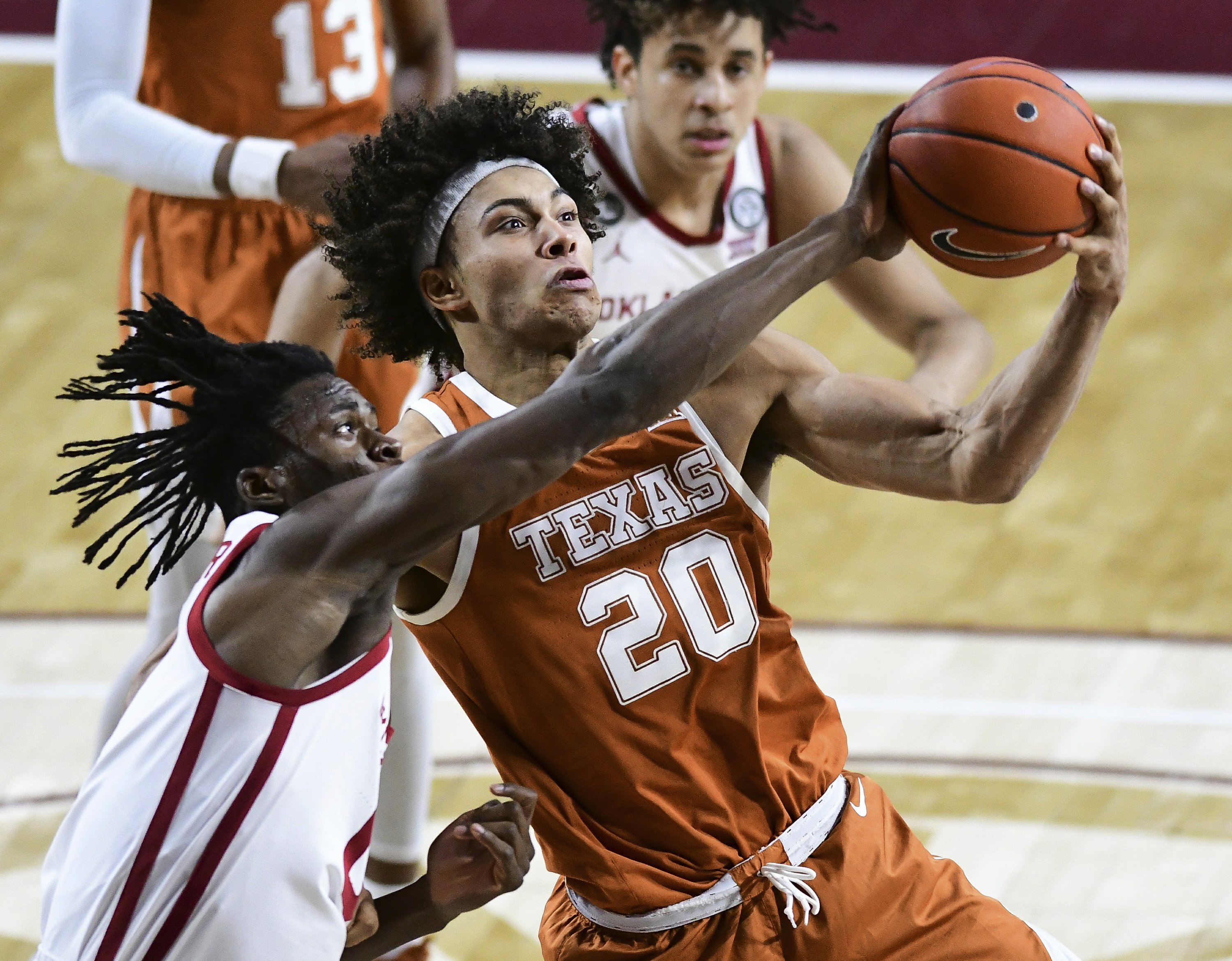 Sims leads No. 15 Texas past No. 16 Oklahoma 69-65