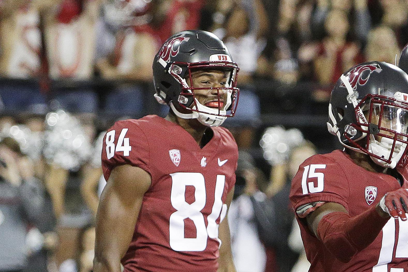 Former player sues WSU, football coach over dismissal | AP News