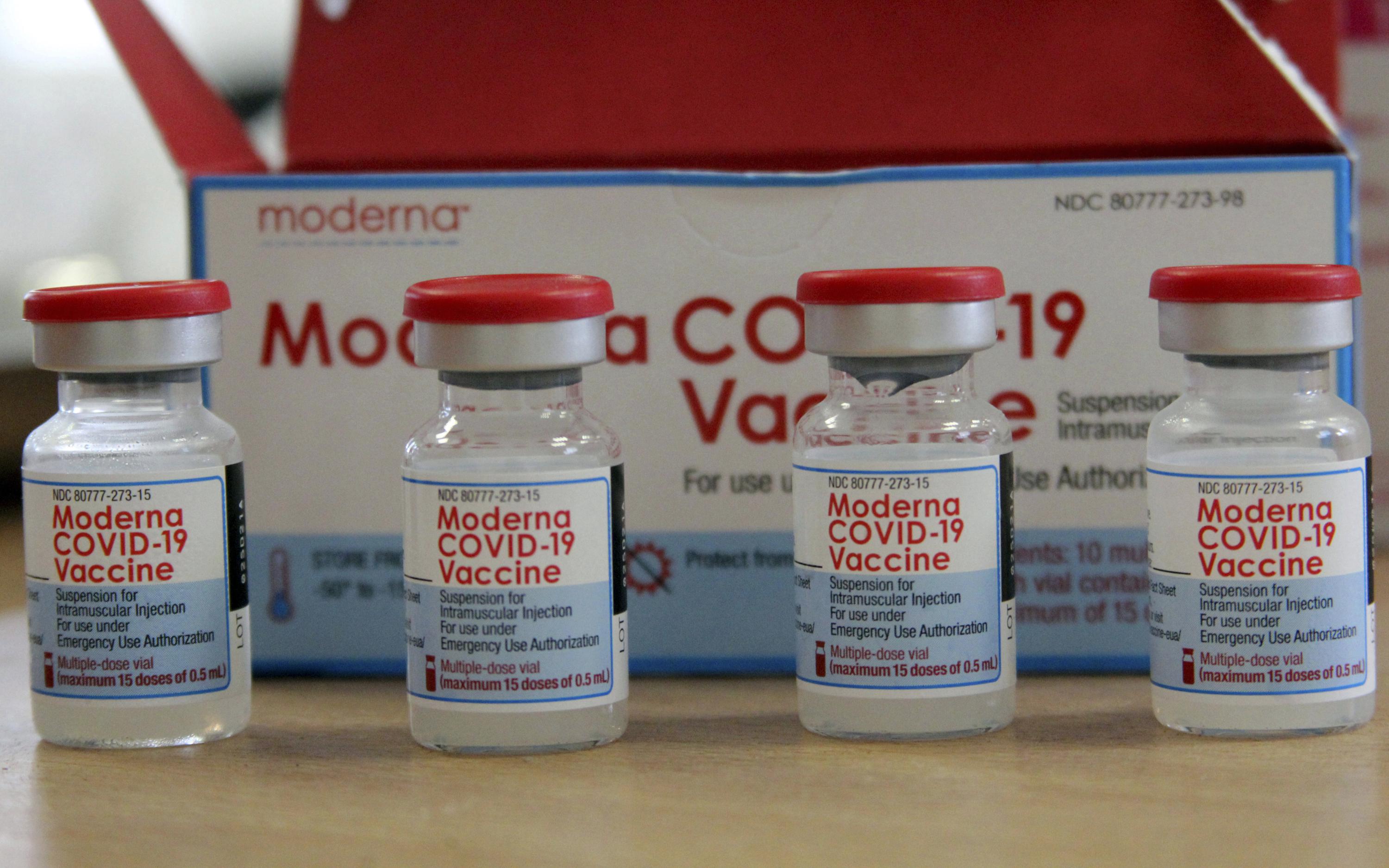 EU drug regulator OKs booster doses of Moderna's COVID shot | AP News