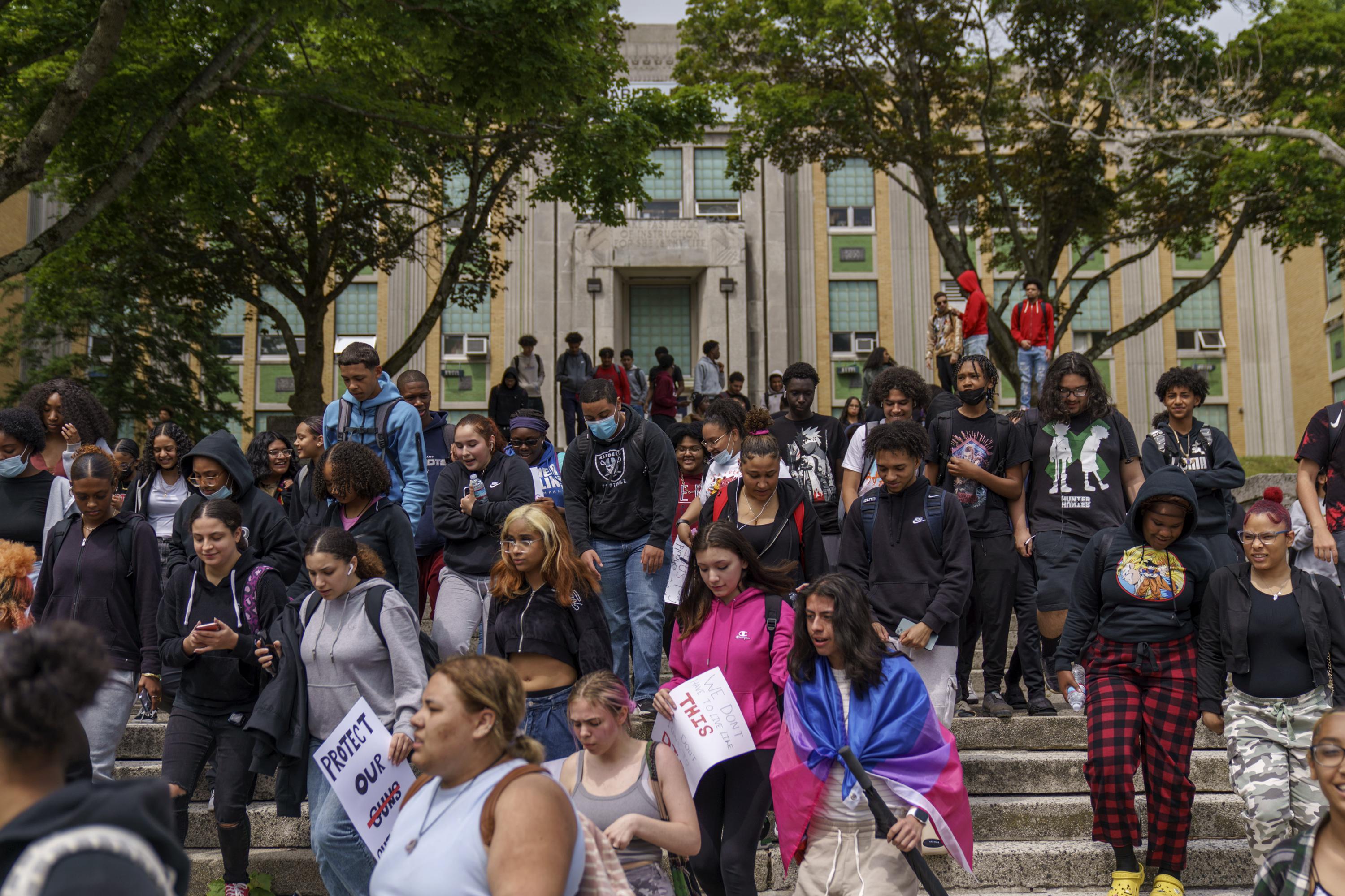 High school students walk out in protest of gun policies | AP News