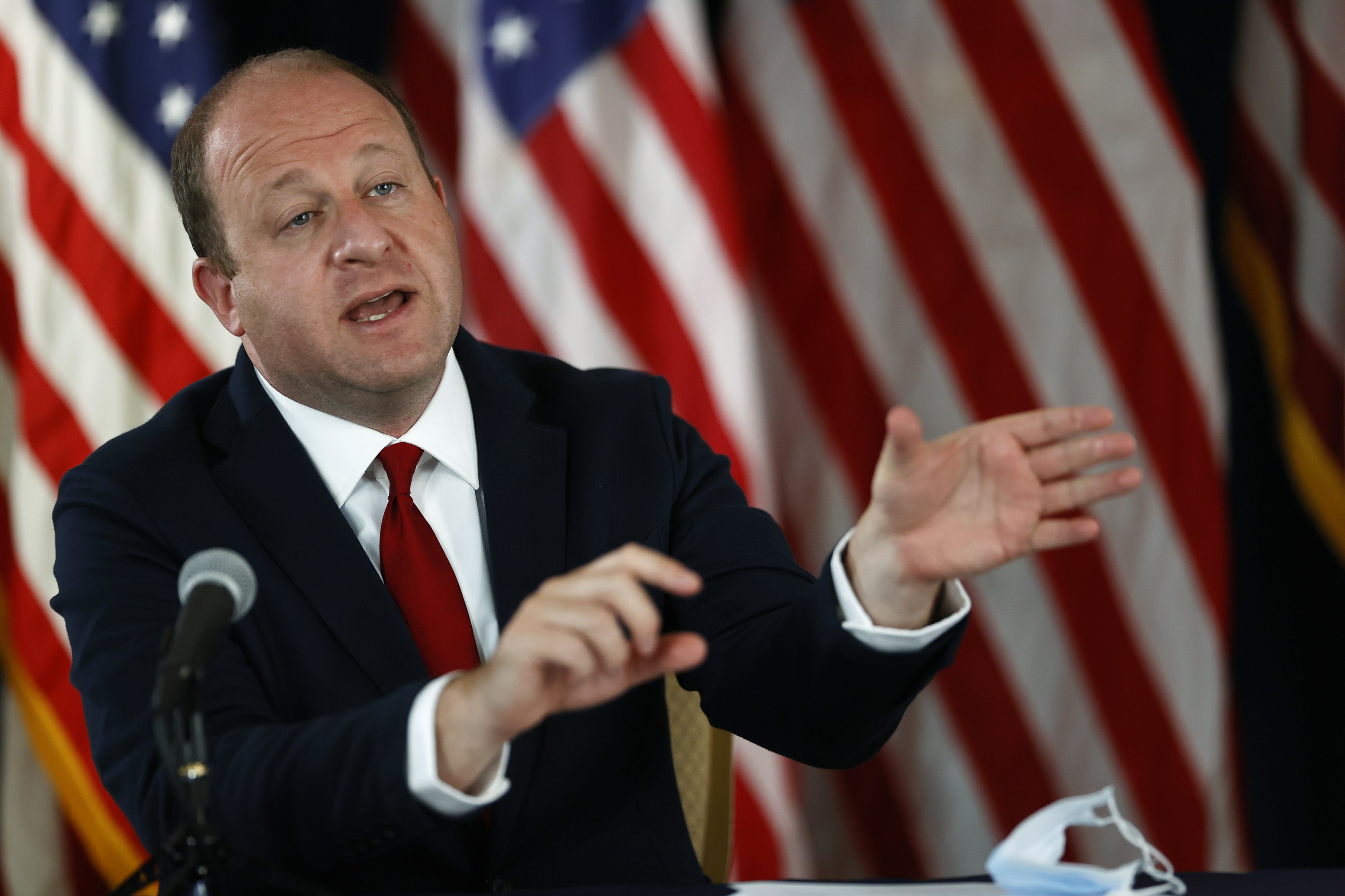 Colorado governor orders indoor statewide mask order | AP News