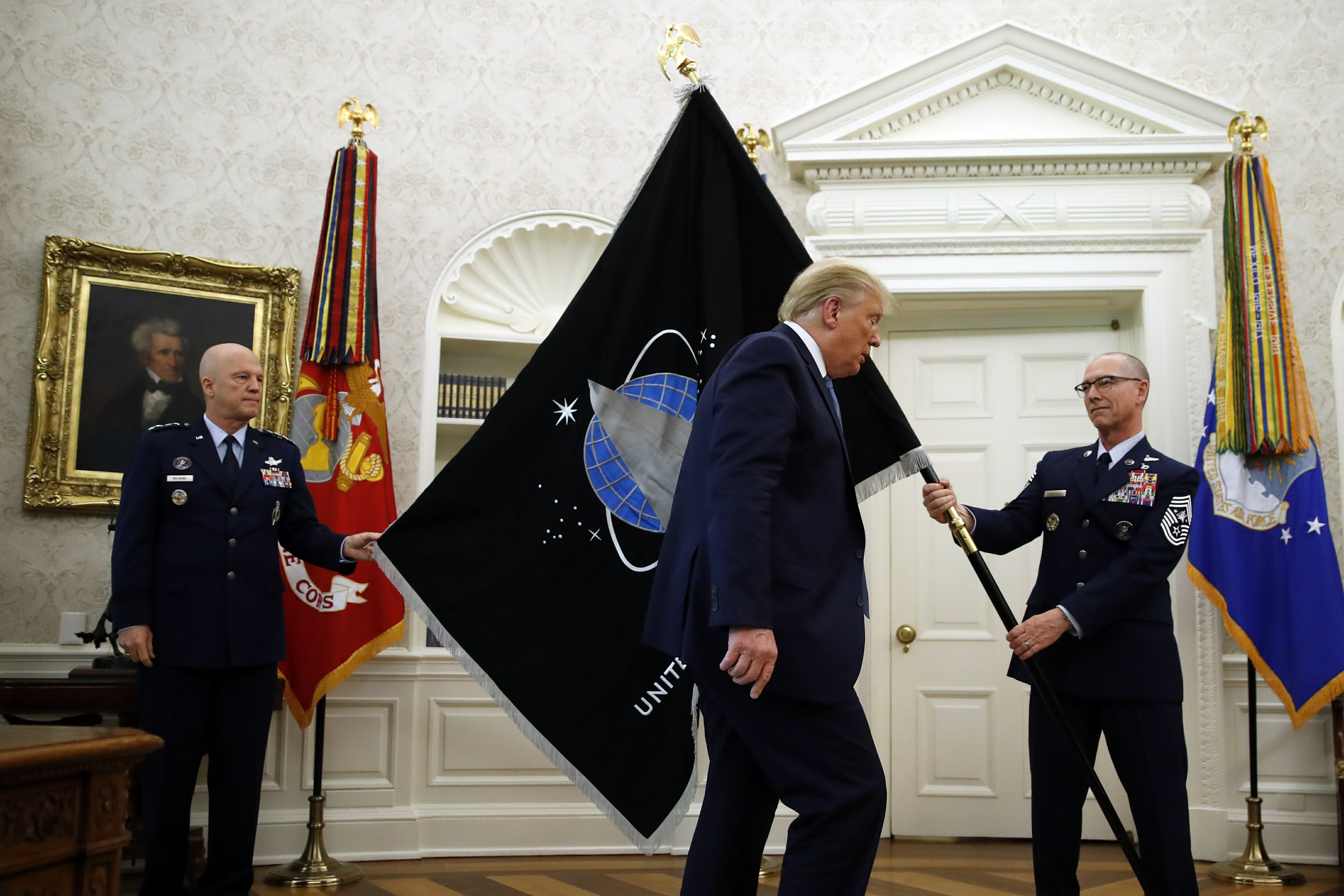 Space Force unveils flag; Trump touts 'super-duper missile' | AP News