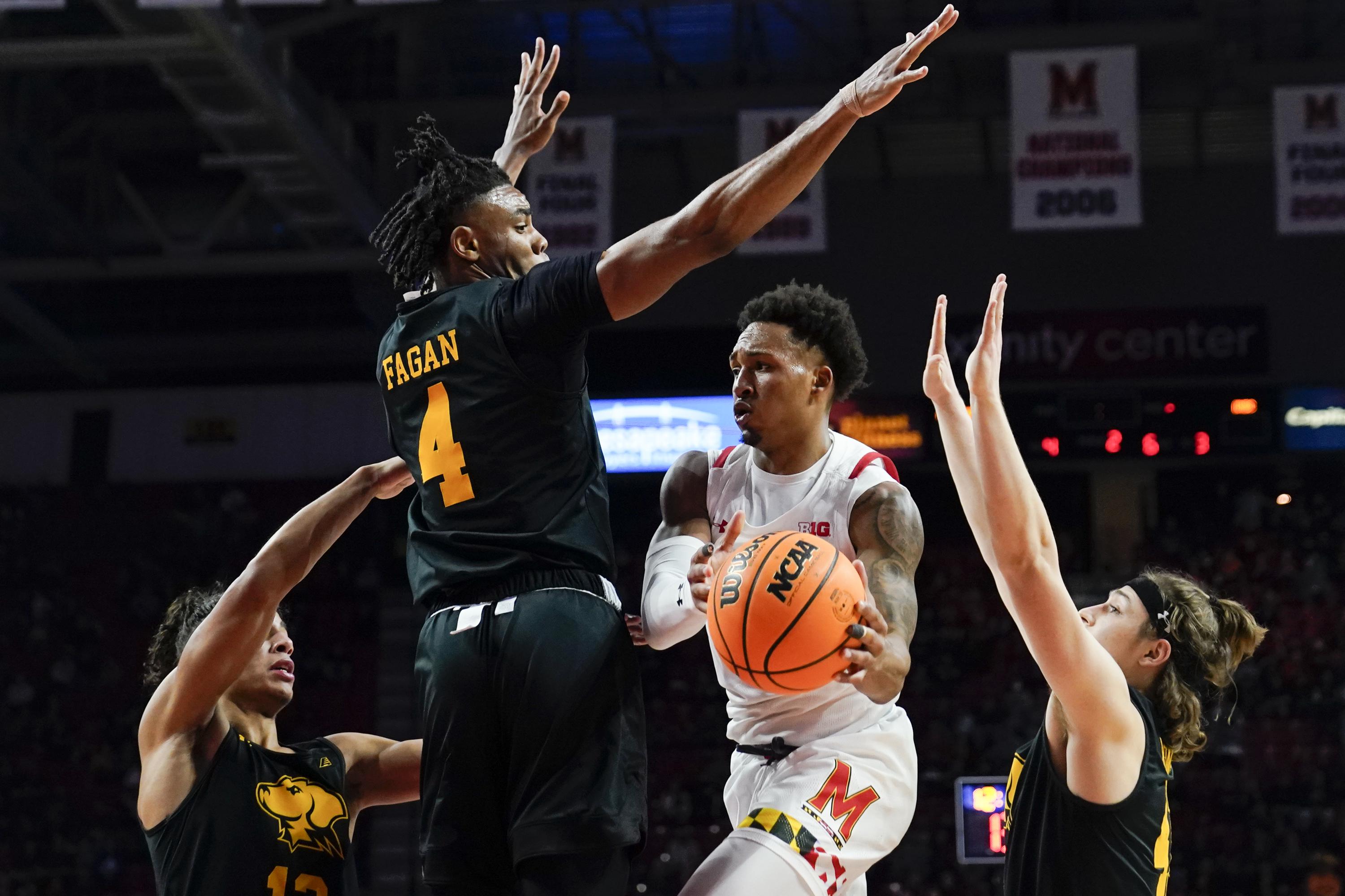 Carey, Young spark Maryland to 80-64 victory over UMBC | AP News