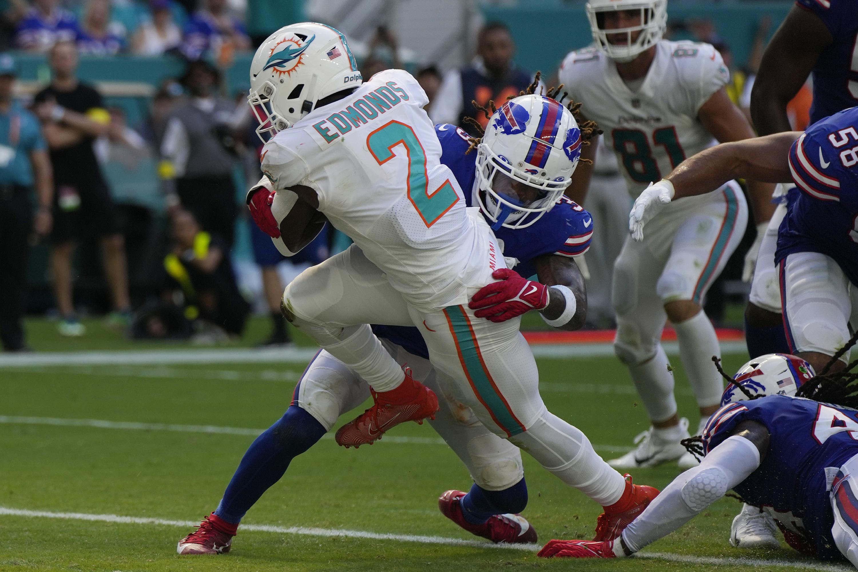 Dolphins resisten para derrotar a Bills y seguir invictos | AP News