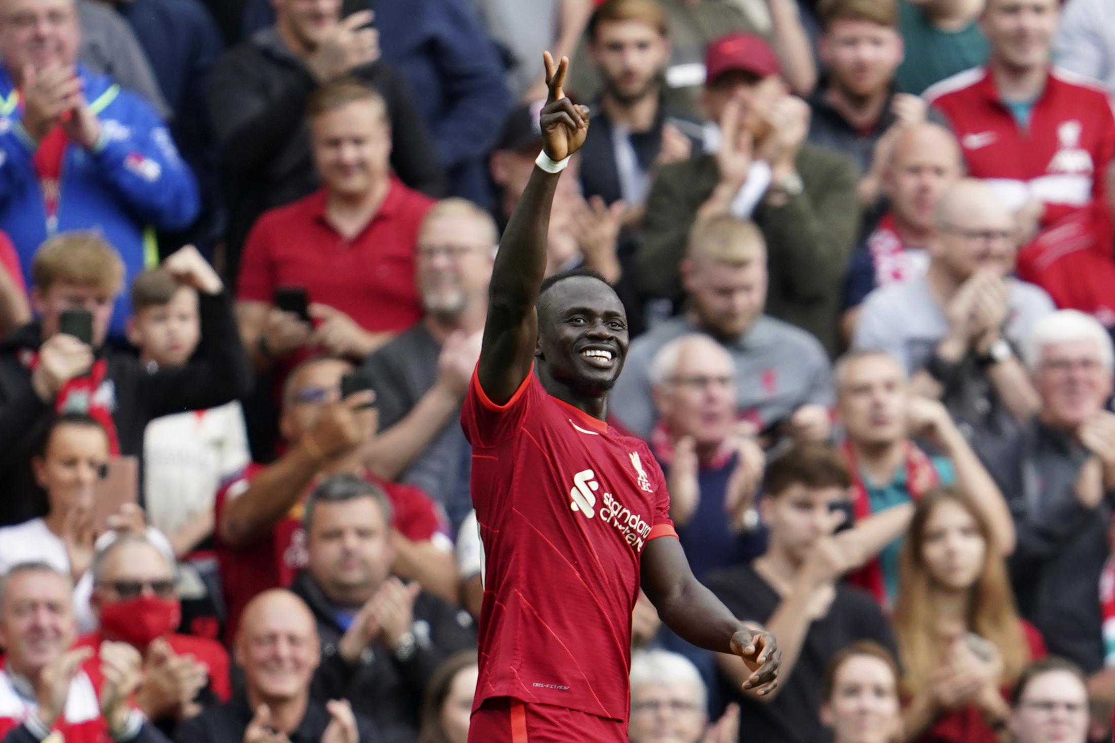 Mane reaches 100 goals for Liverpool in 3-0 win over Palace | AP News