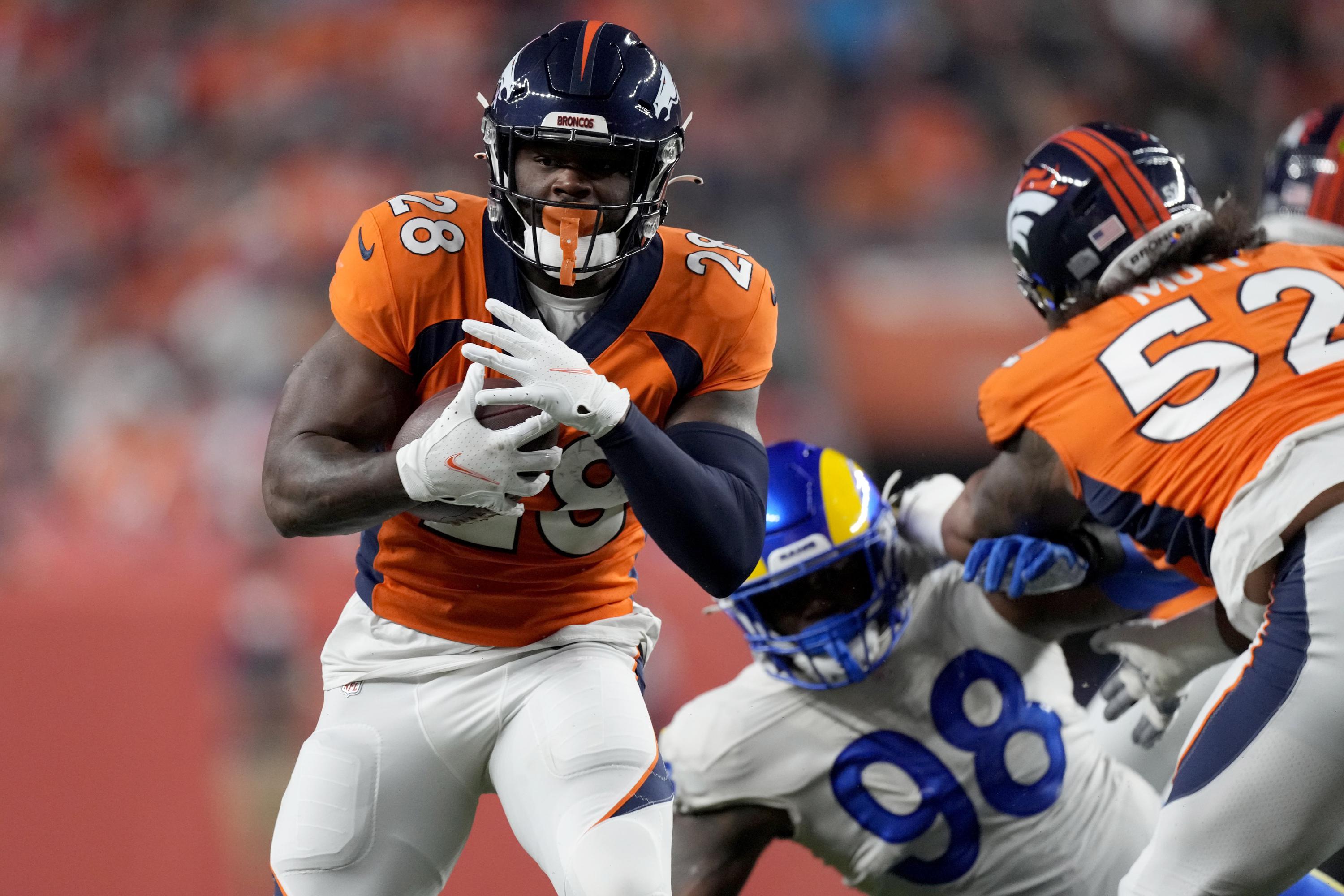 Panthers add depth at running back, claim Royce Freeman | AP News