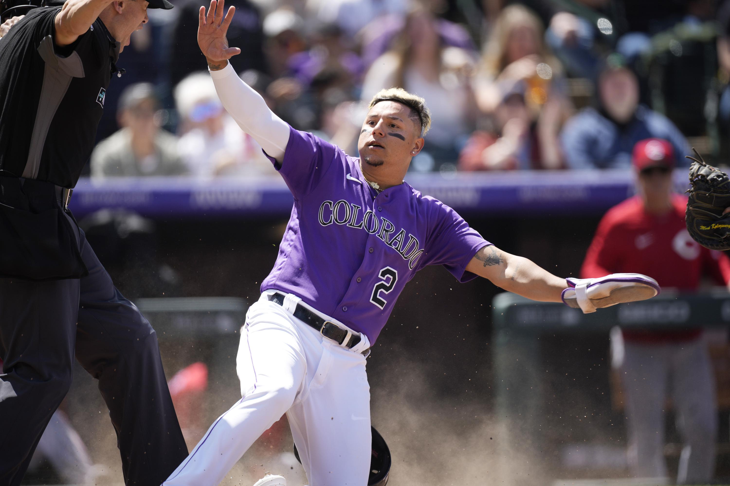 Freeland tosses 7 solid innings, Rockies beat Reds, 10-1 | AP News