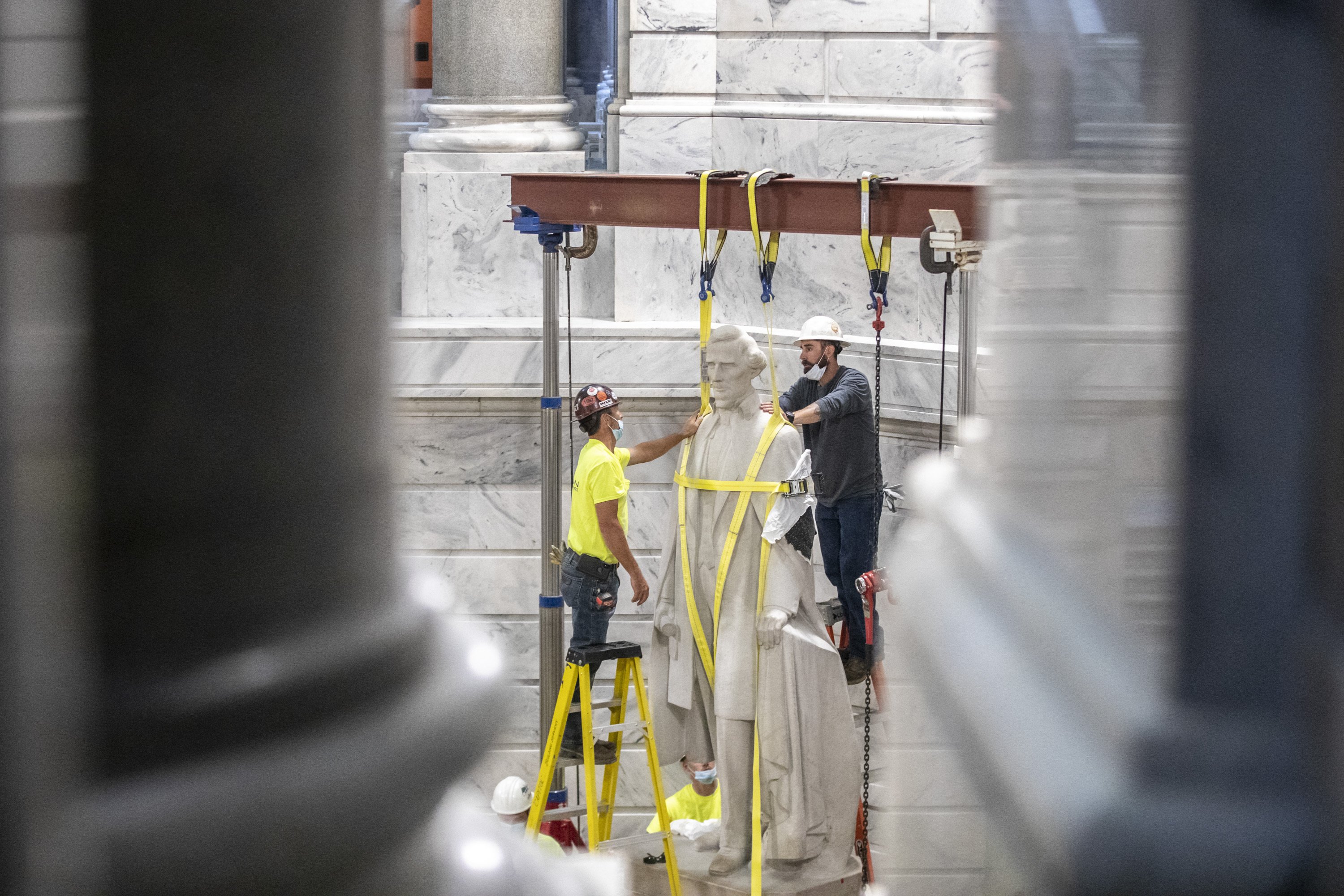 Governor has role in Davis statue's removal from Capitol | AP News