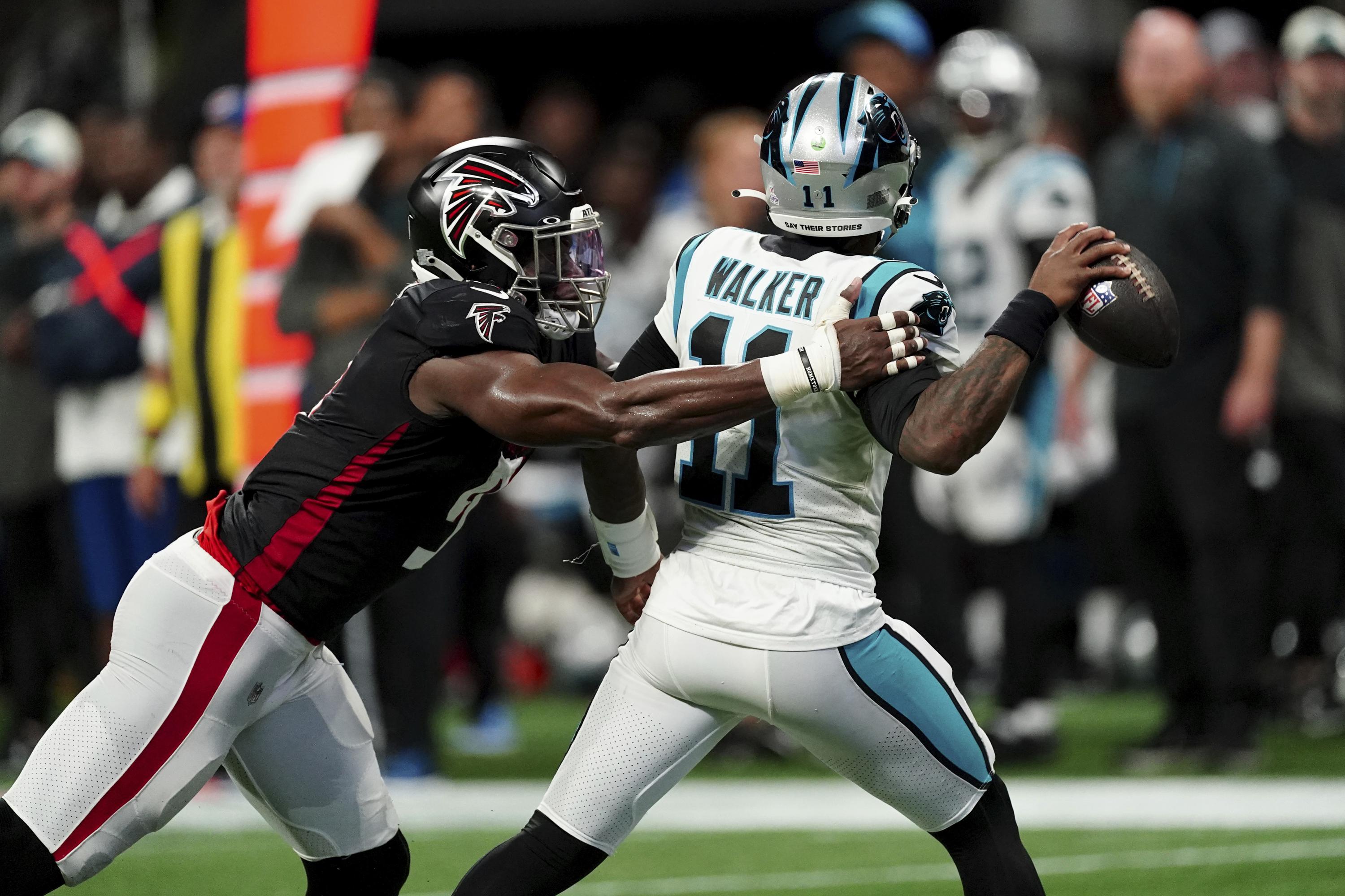 Walker, Panthers look to bounce back vs 1st-place Falcons | AP News