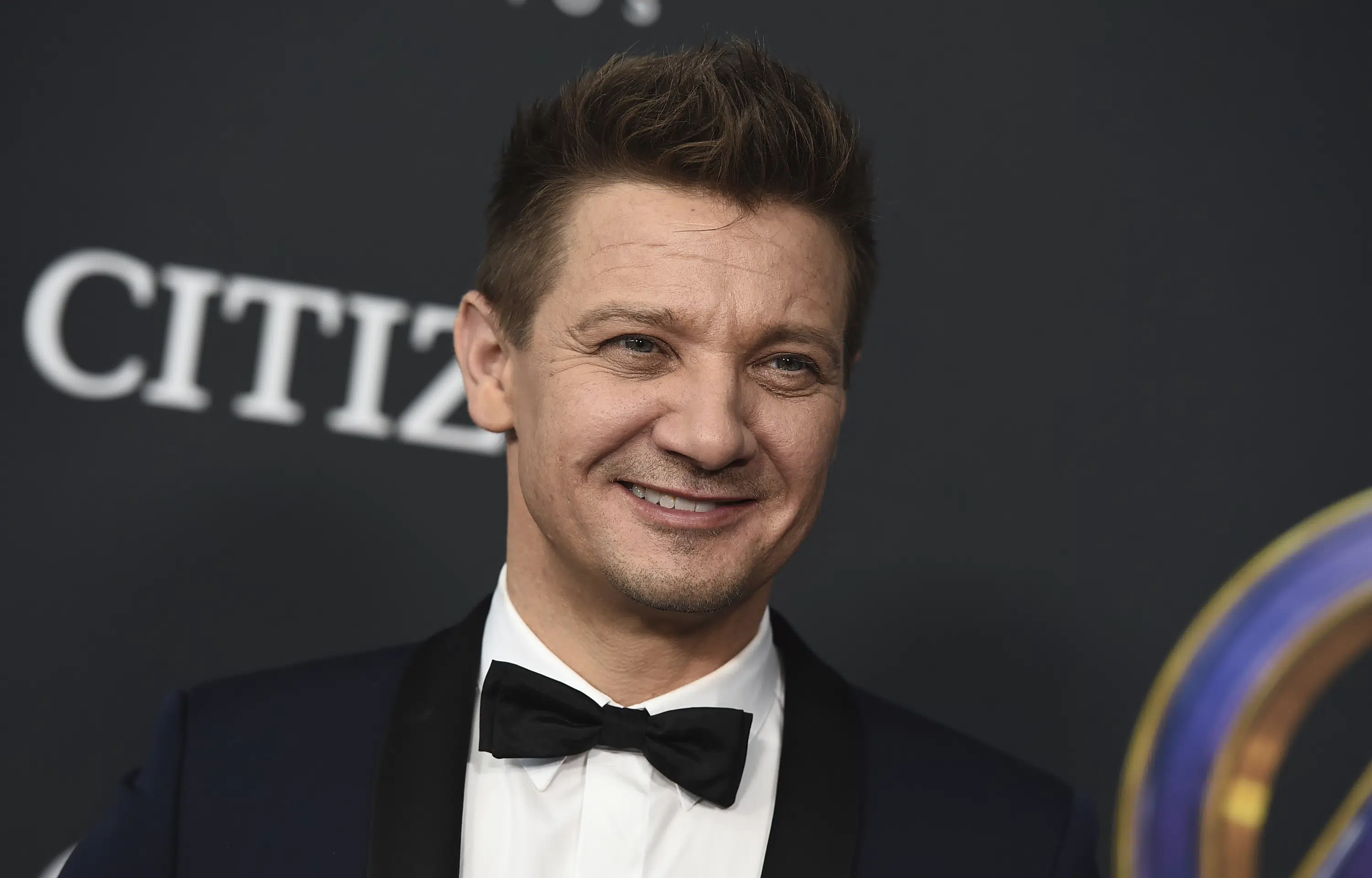 Jeremy Renner says he broke 30-plus bones in snowplow mishap | AP News