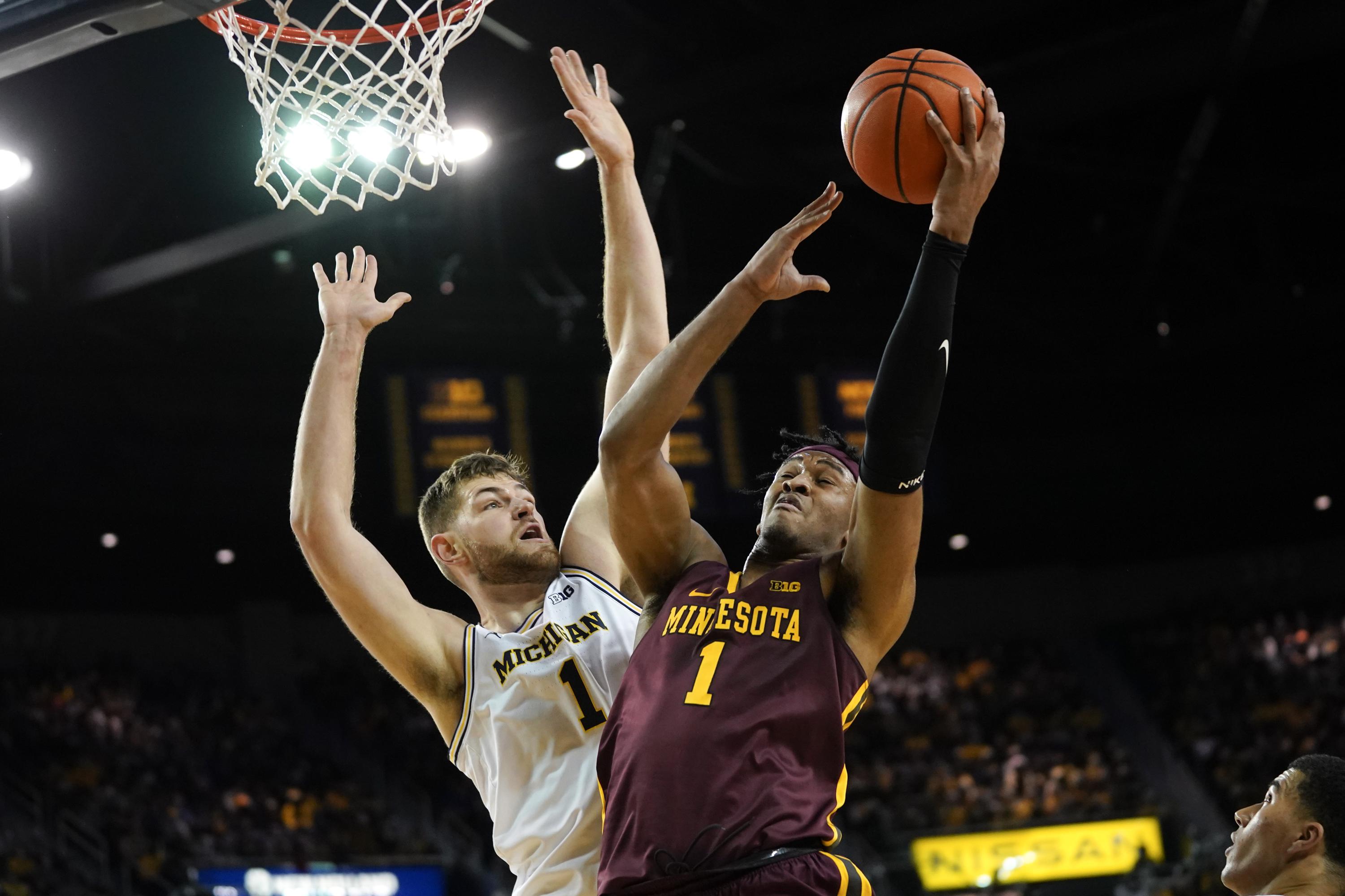 Battle's season-high 27 boosts Minnesota past Michigan 75-65 | AP News
