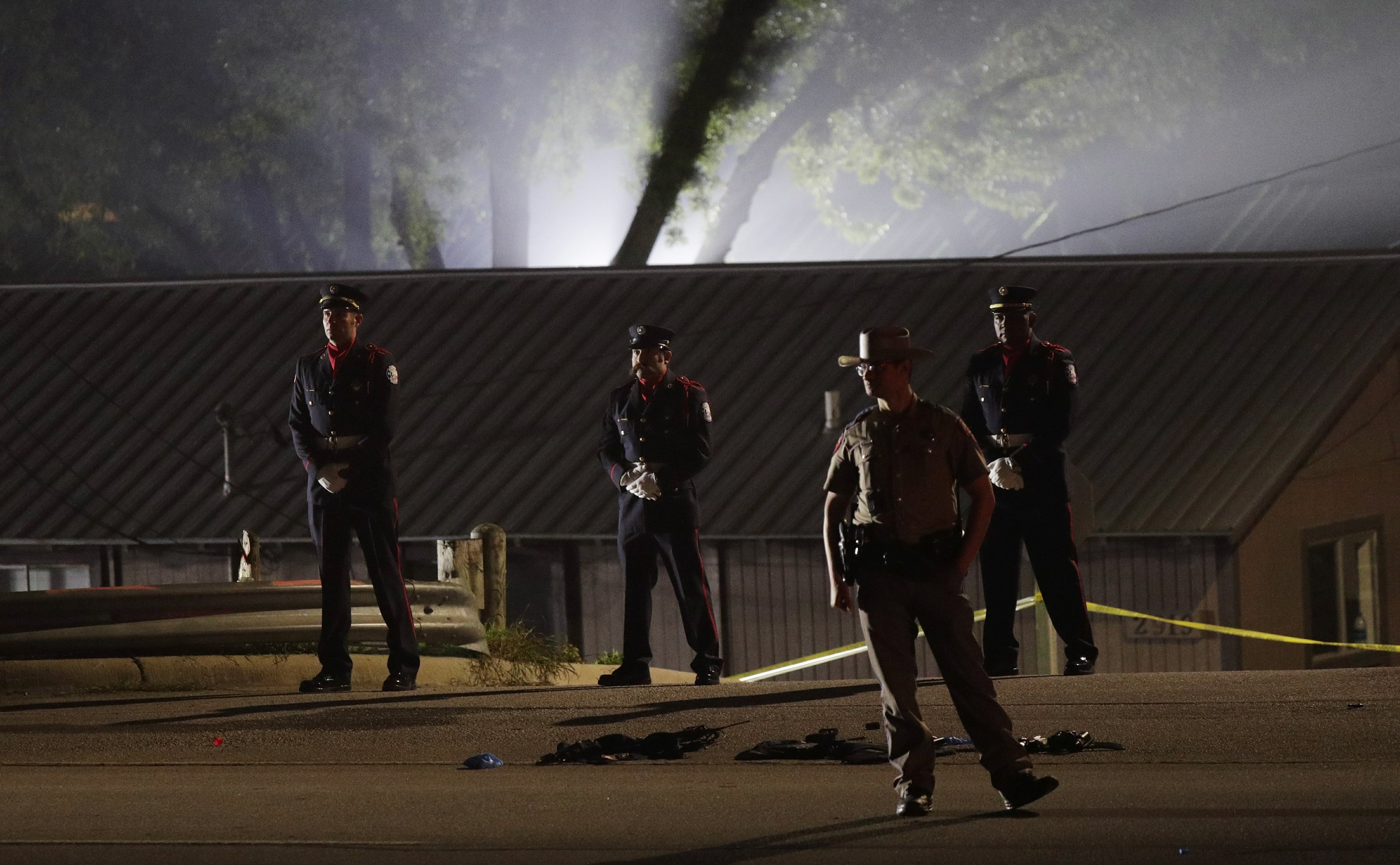 Texas police officer killed, 2 others wounded in shooting | AP News