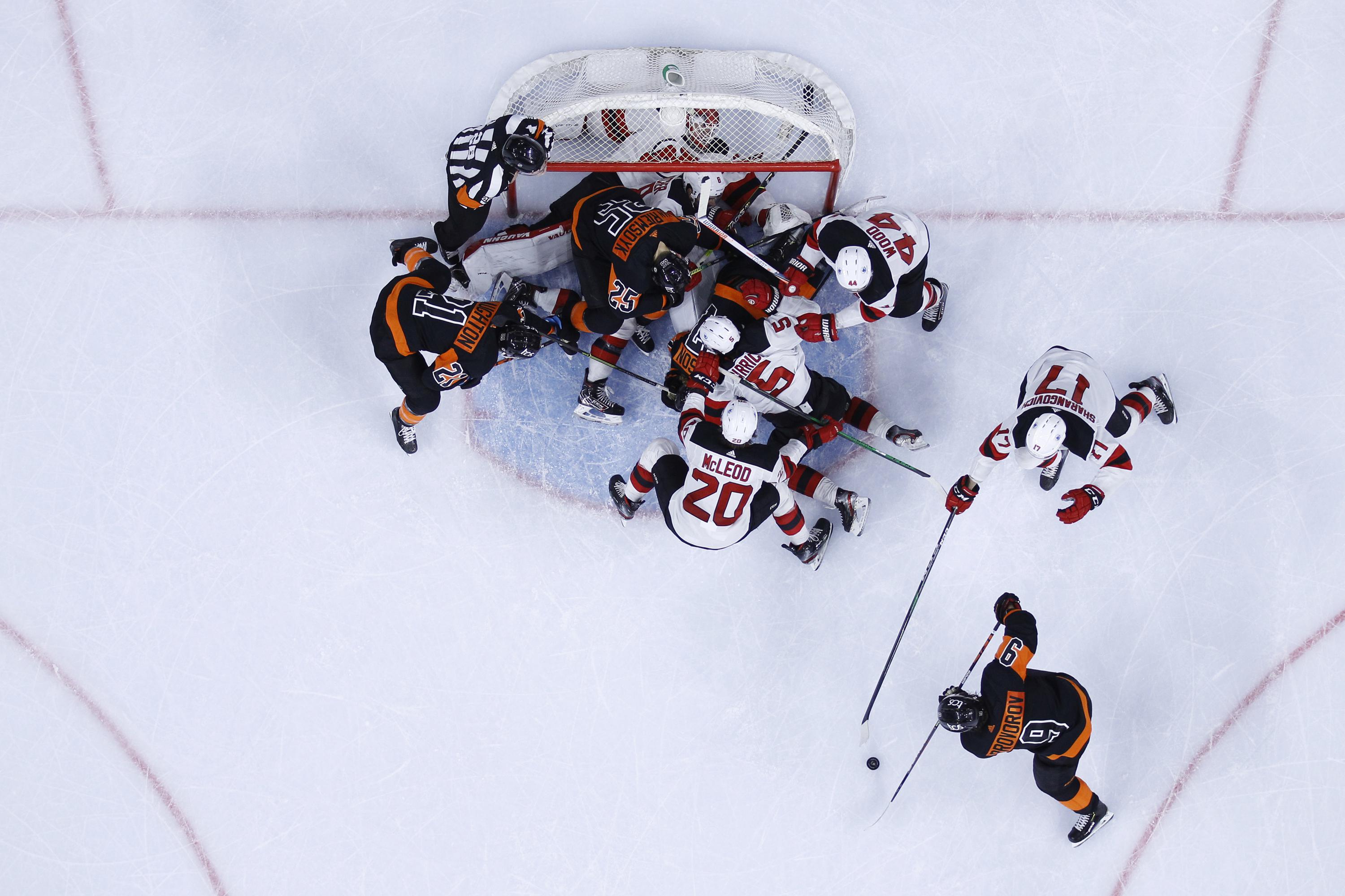 Flyers rally from 2-goal deficit, beat Devils in shootout | AP News