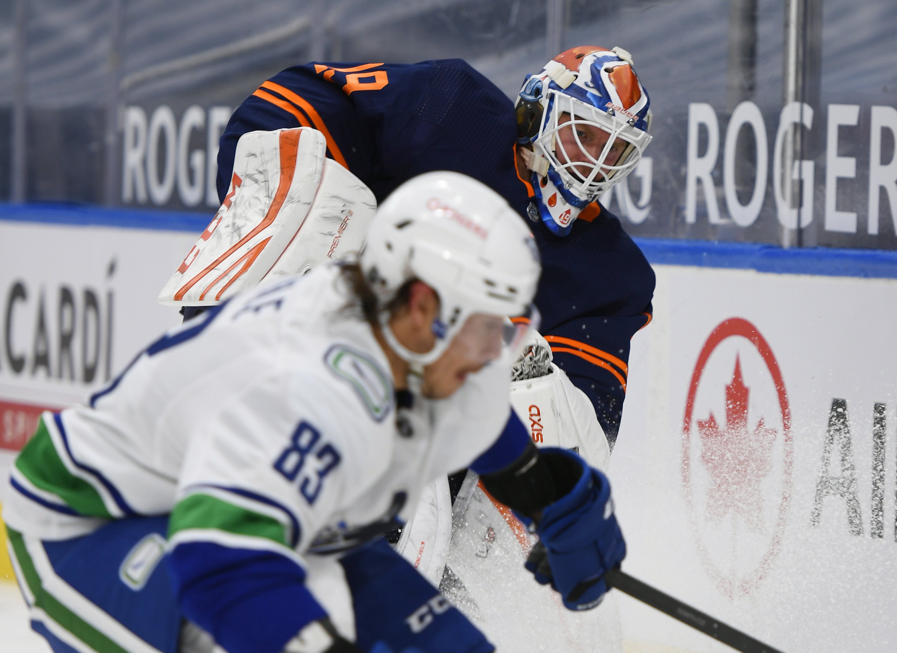 Boeser scores twice, Canucks beat Oilers 5-3 | AP News