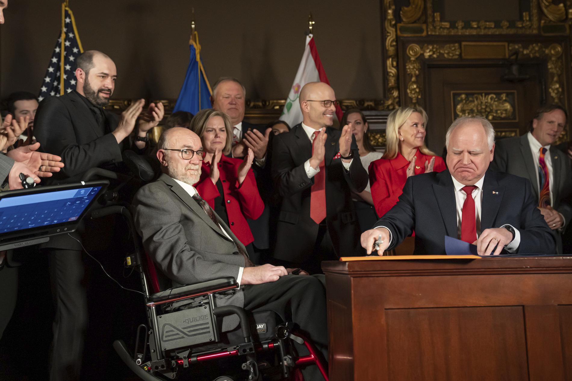 EXPLAINER: Walz signs ALS bill by senator with the disease | AP News