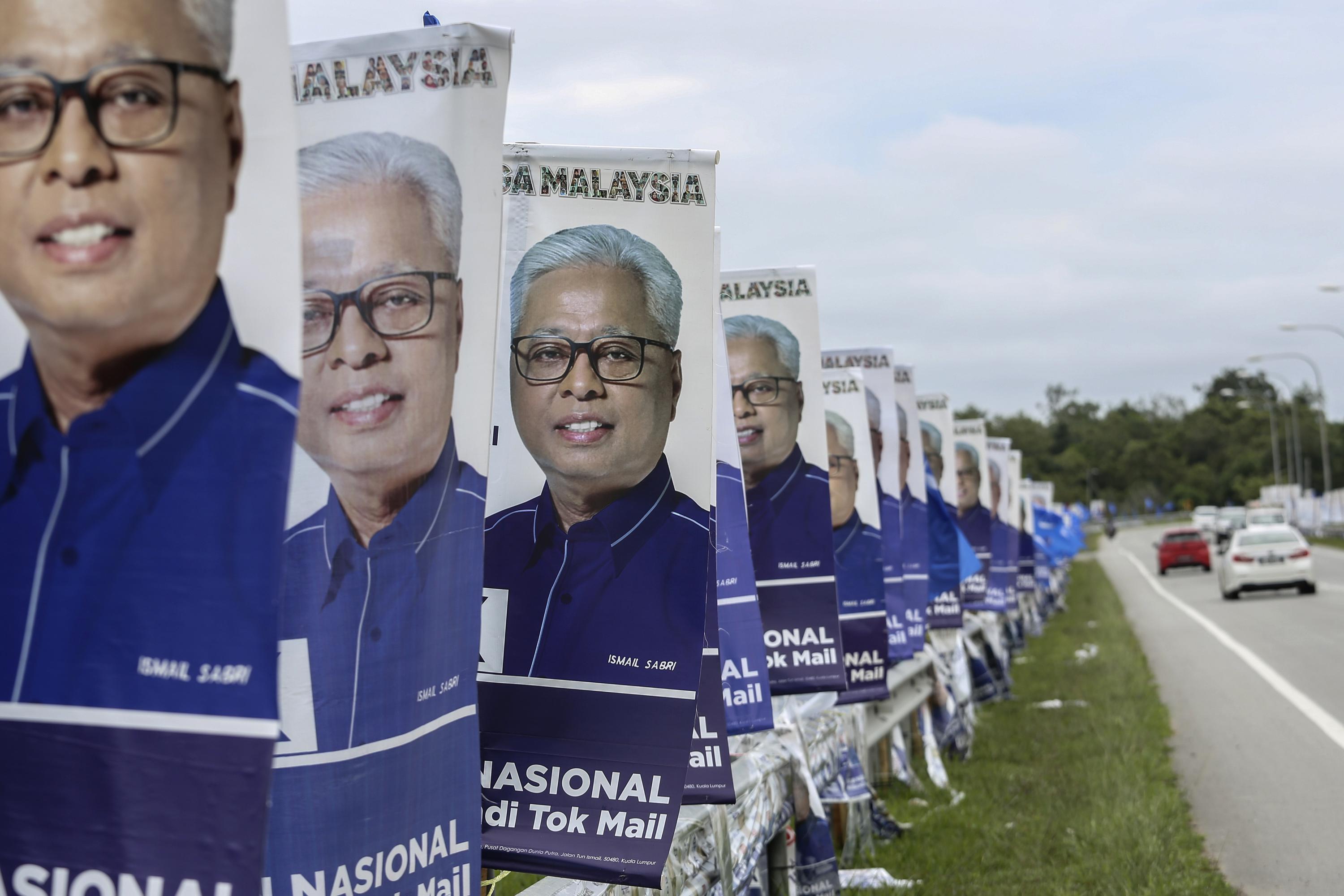 Malaysia's political candidates make final pitches to voters | AP News