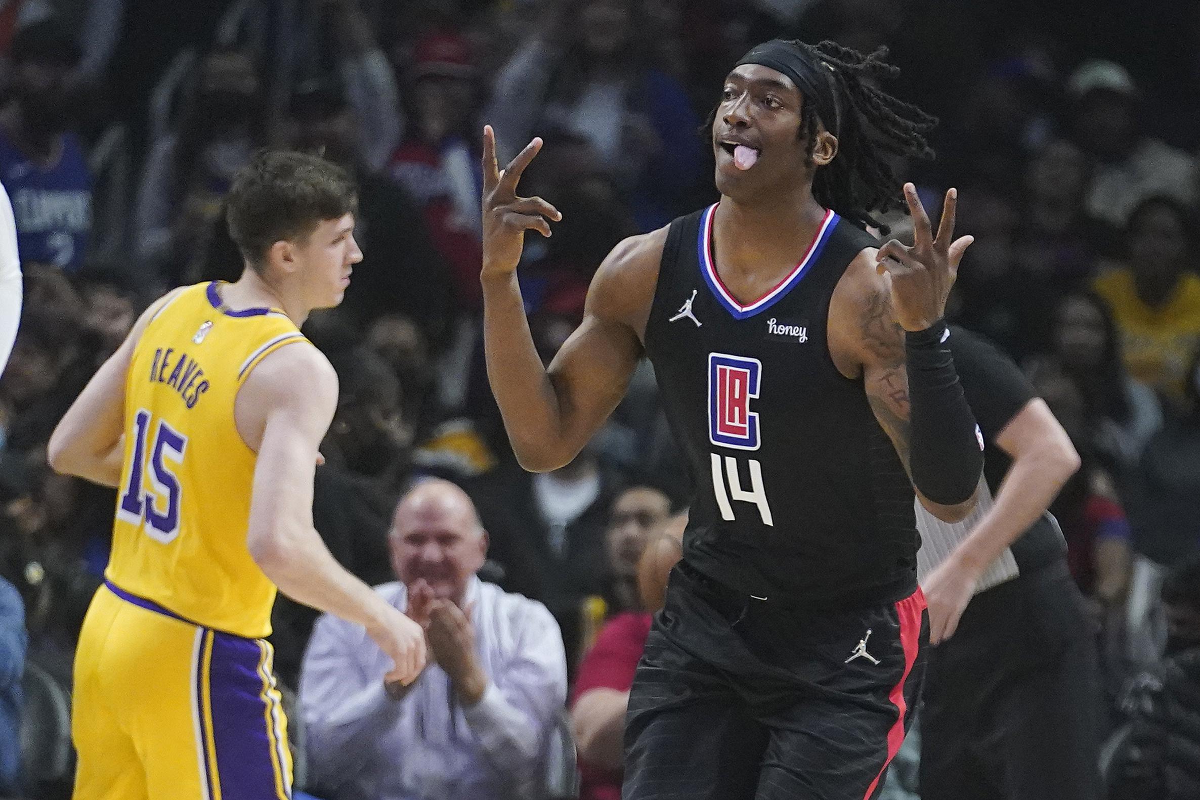 Clippers surge to 132-111 victory, season sweep of Lakers | AP News