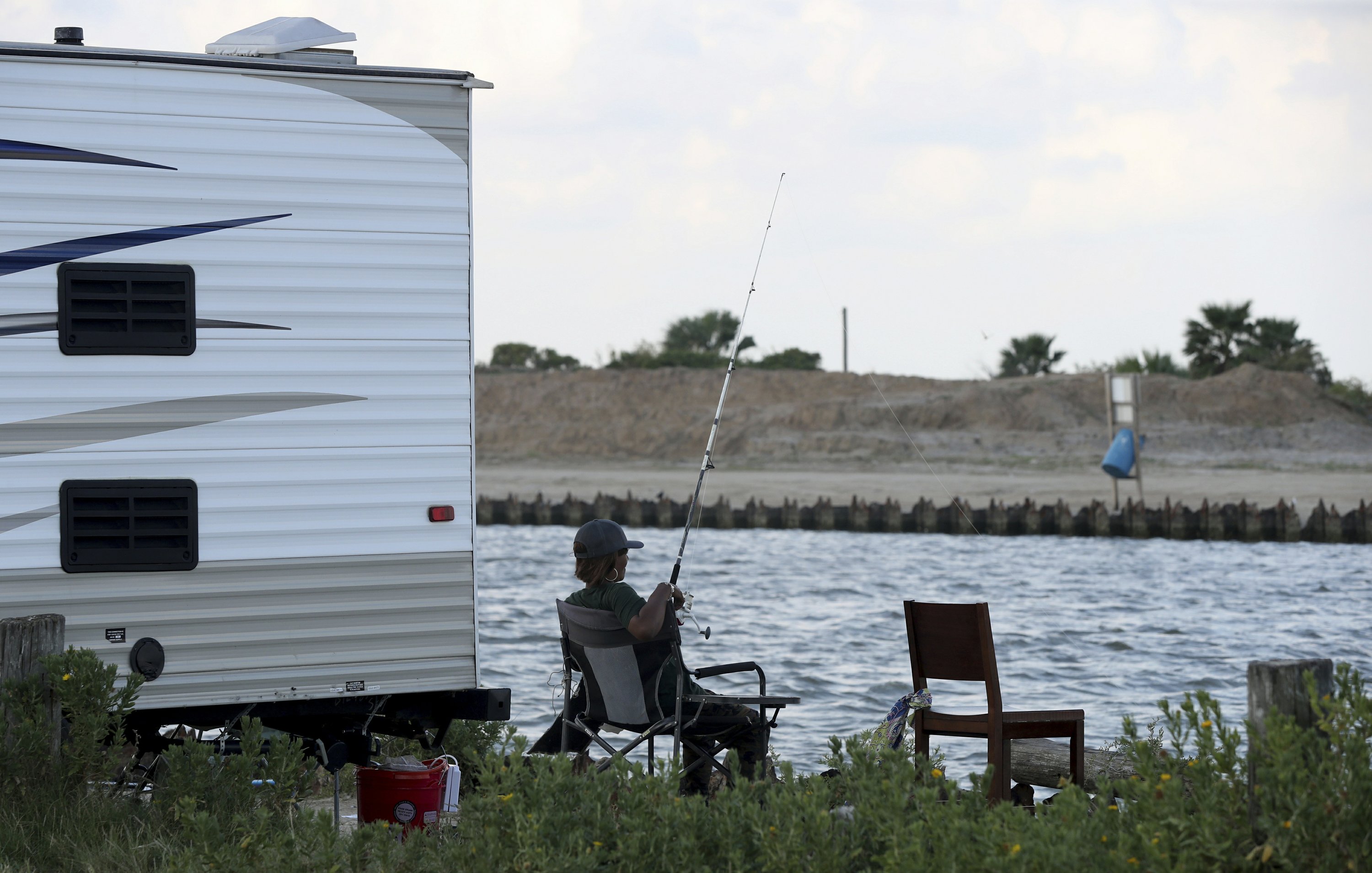 Popular Texas fishing spot Rollover Pass closing this month | AP News
