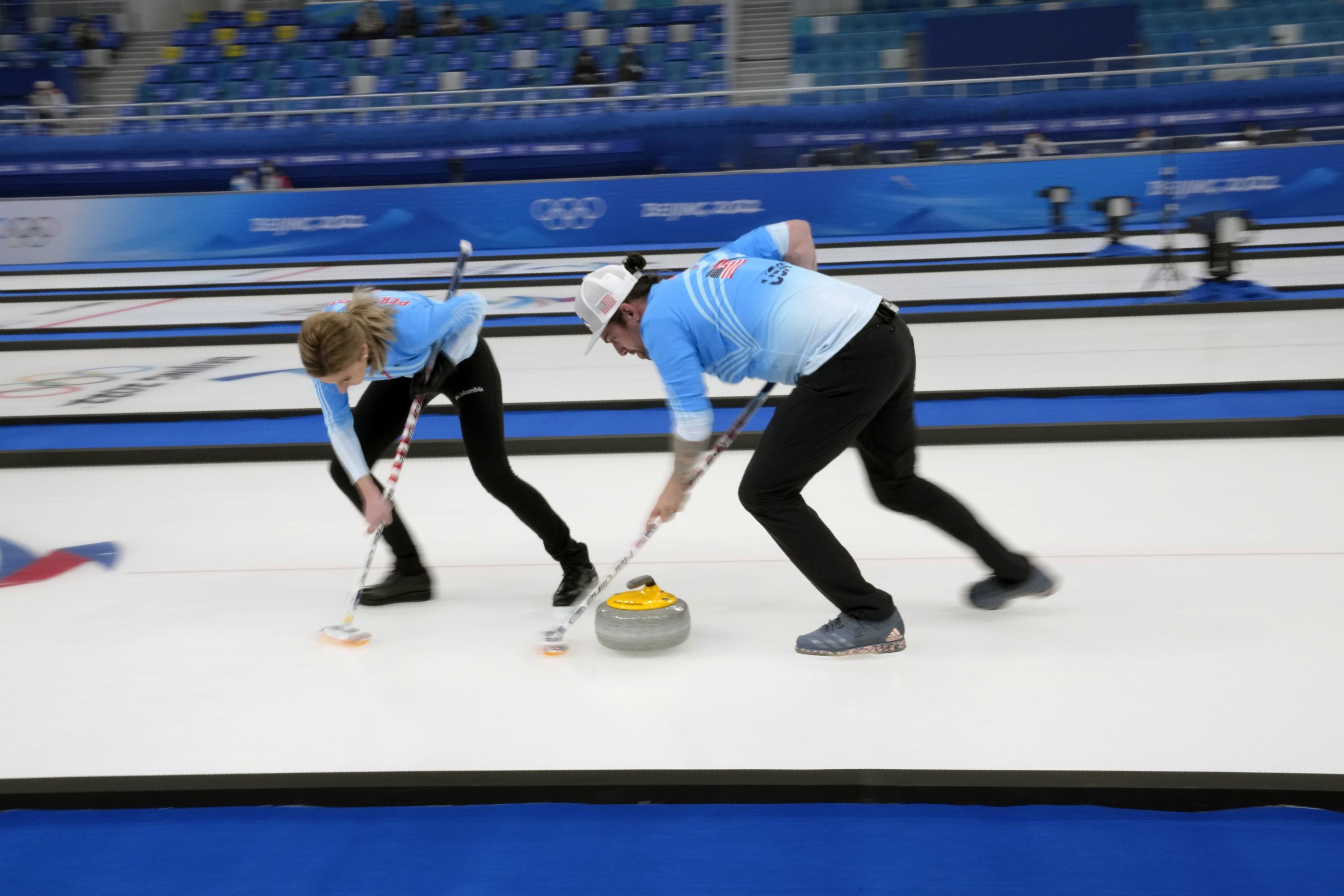 A hug, a wave, a big win for American mixed doubles curlers | AP News
