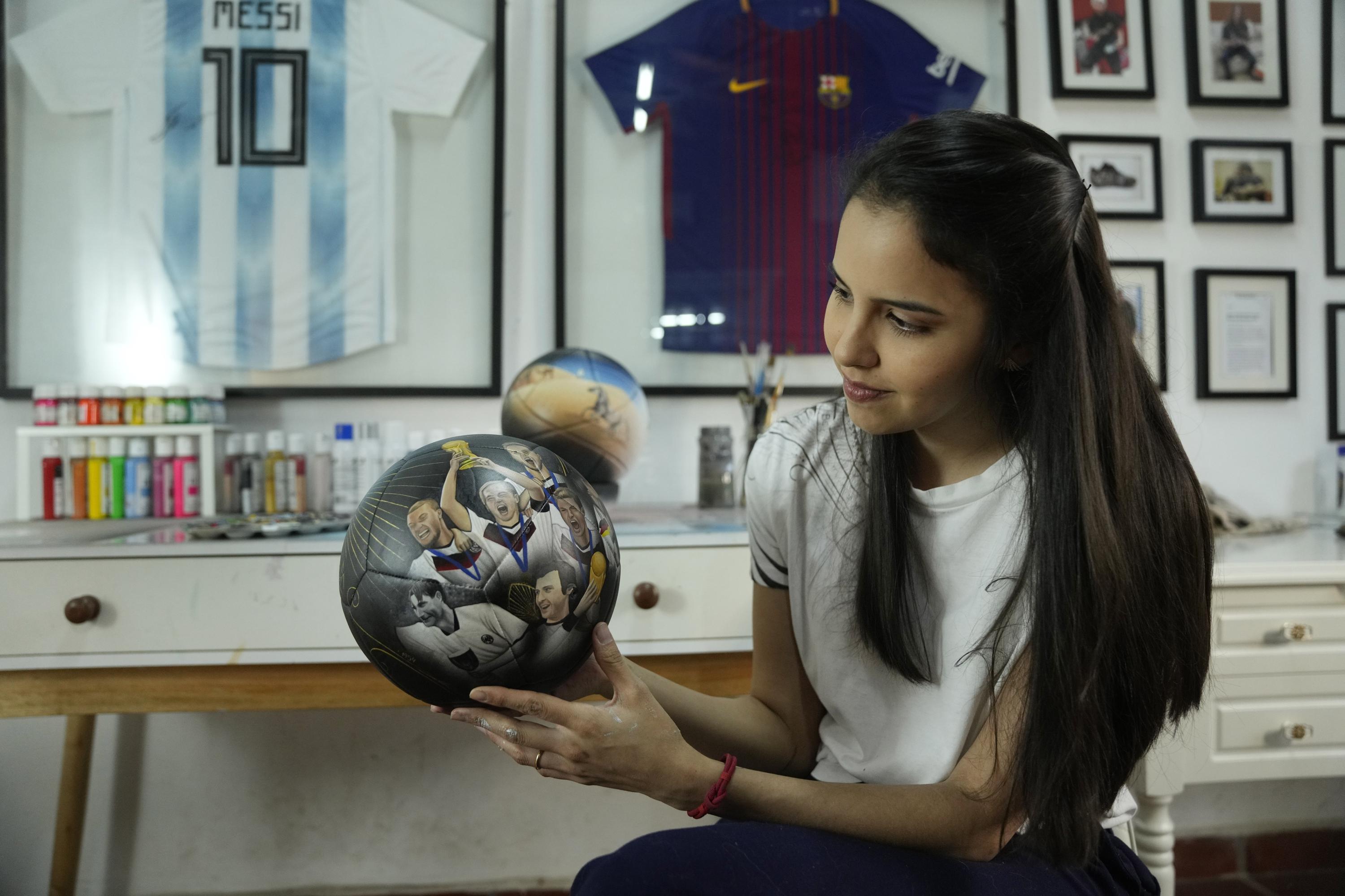 Soccer-inspired art show heads to World Cup in Qatar | AP News