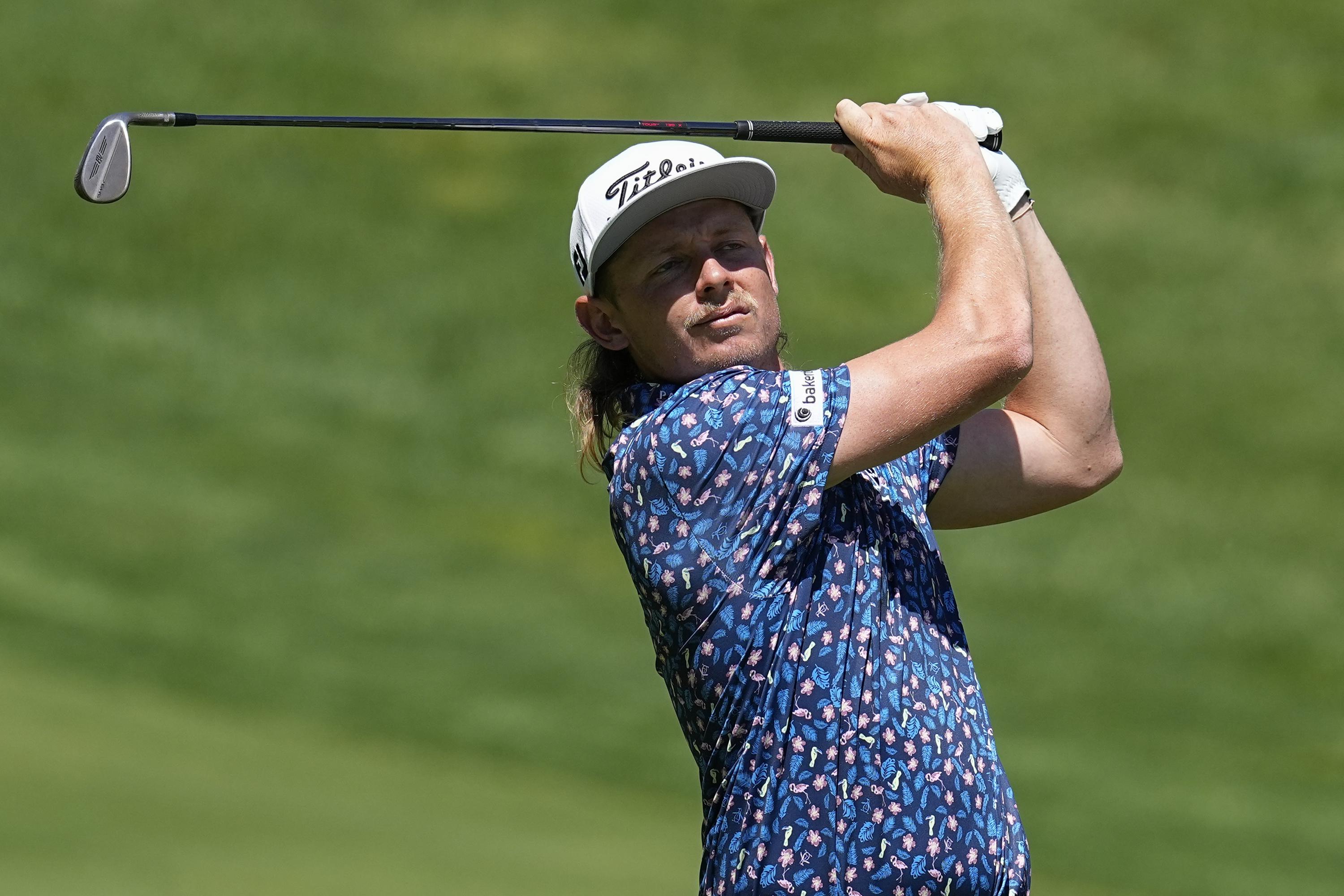 Cameron Smith ignores history and takes lead at Memorial | AP News