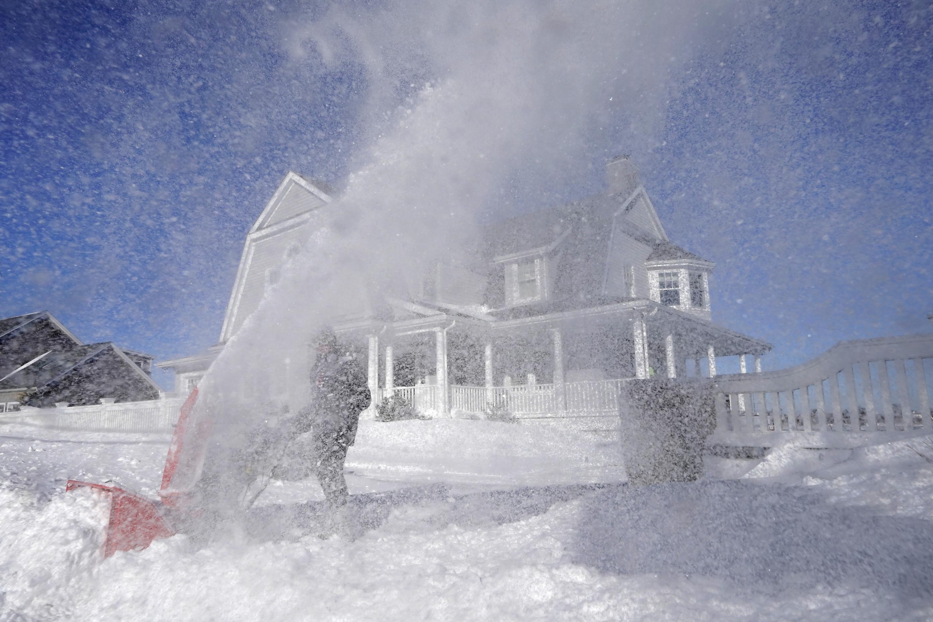 After the blizzard, the East Coast digs out under sunny sky | AP News