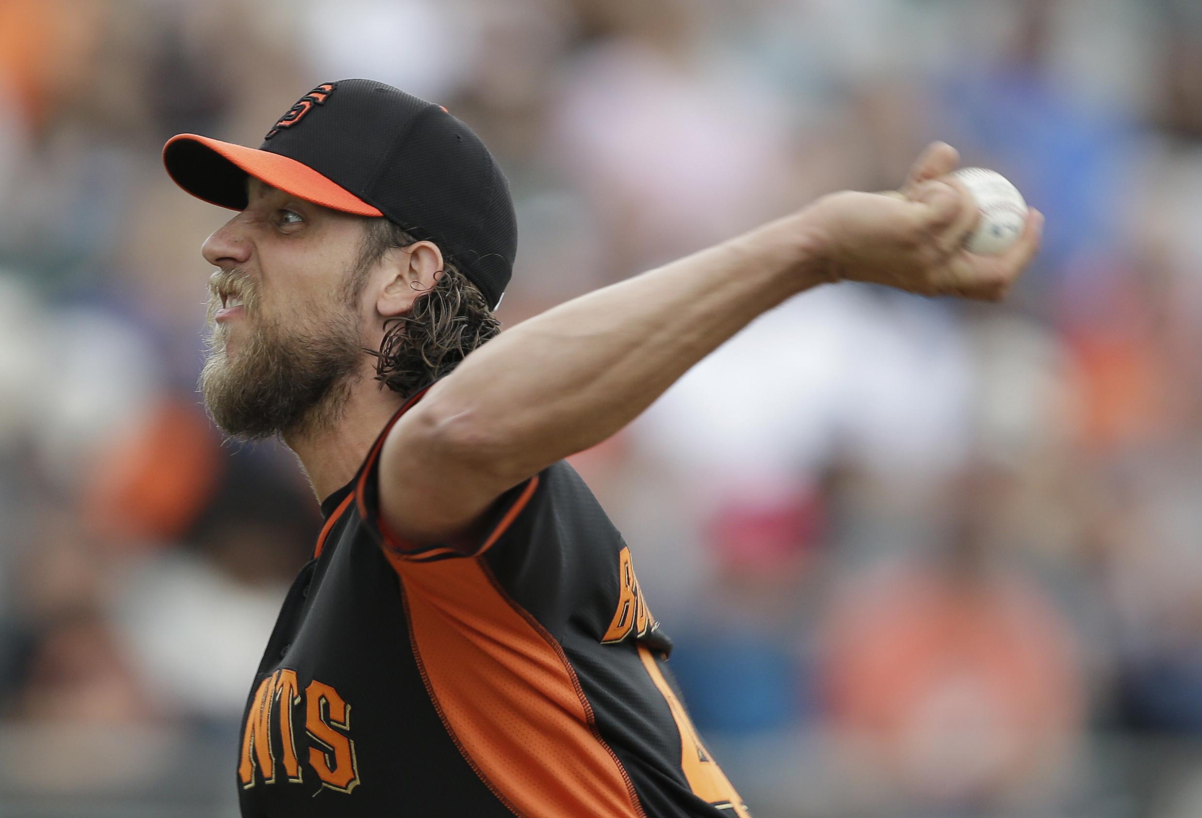 Bumgarner hit hard in spring debut, Athletics beat Giants | AP News