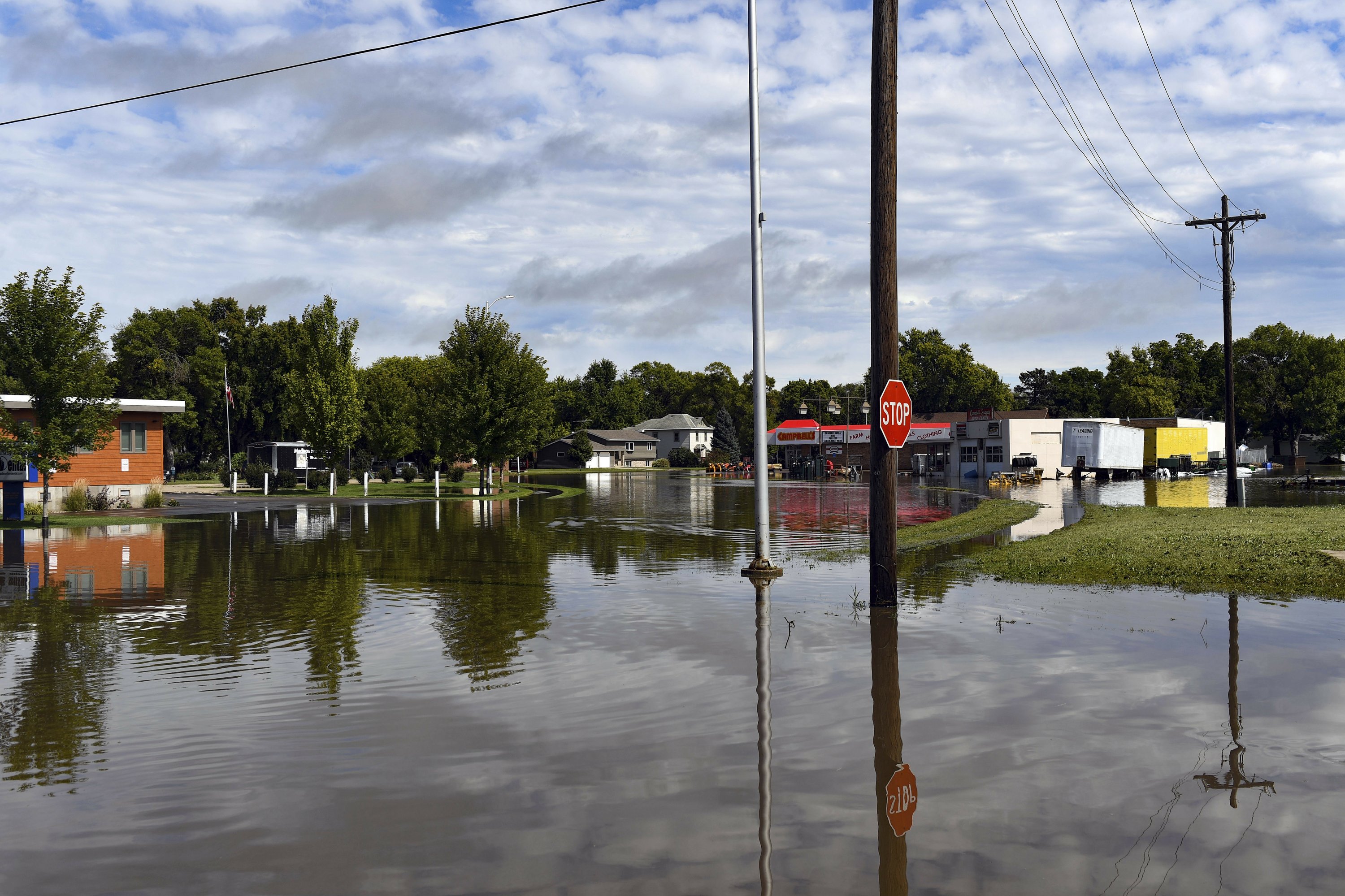 Flooding closes schools, restricts travel in SE South Dakota | AP News