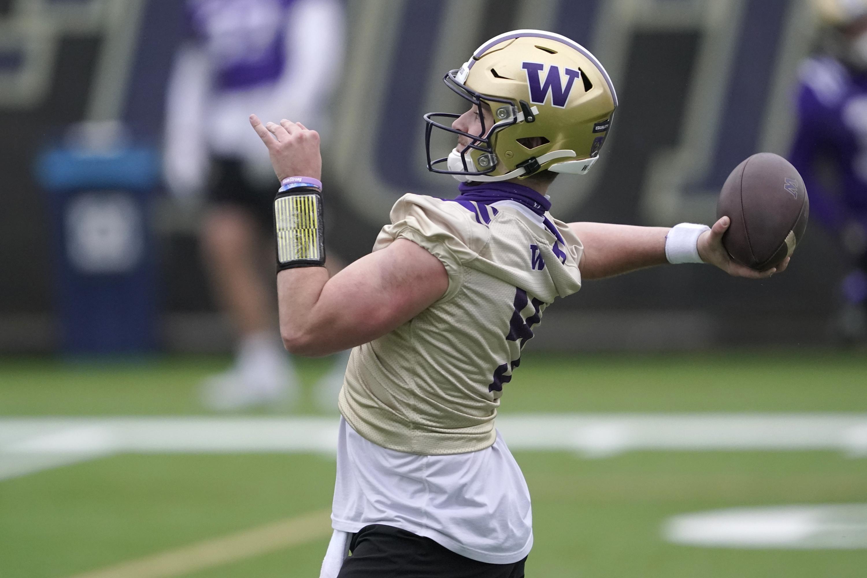 Washington QB competition open as spring practice nears end | AP News