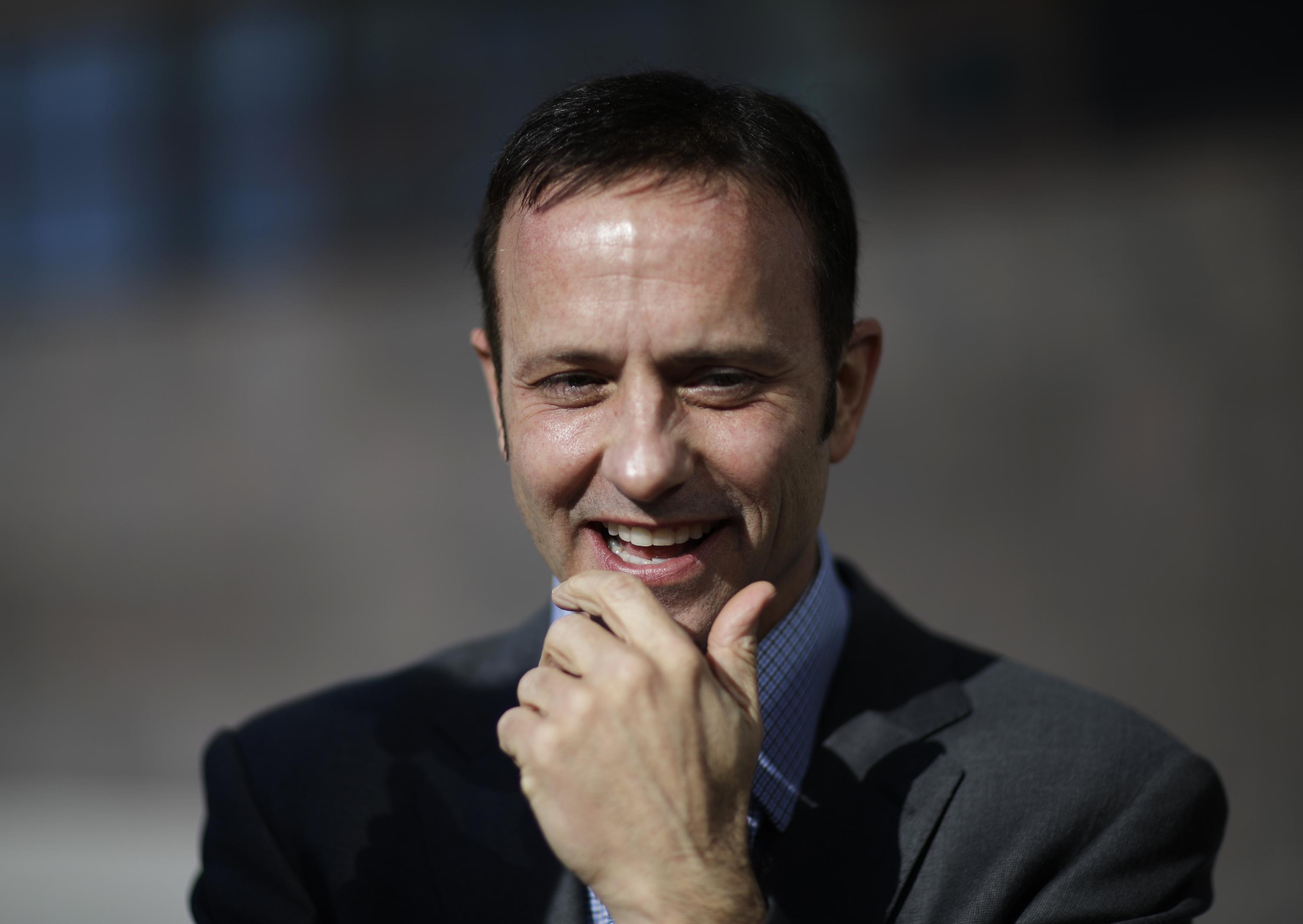 Olympian Boitano builds community through food | AP News