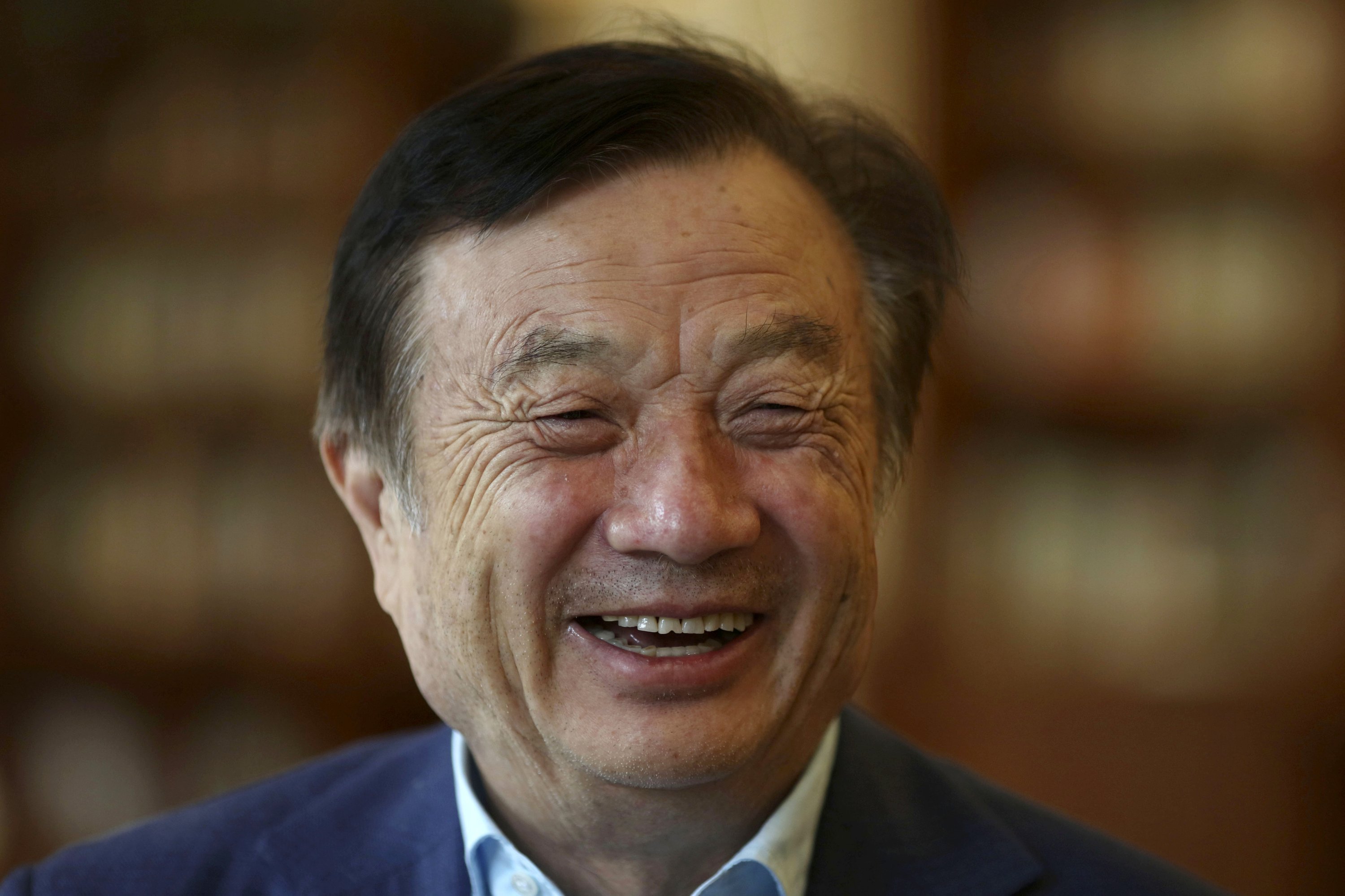 AP Interview: Huawei founder says US woes not hardest crisis