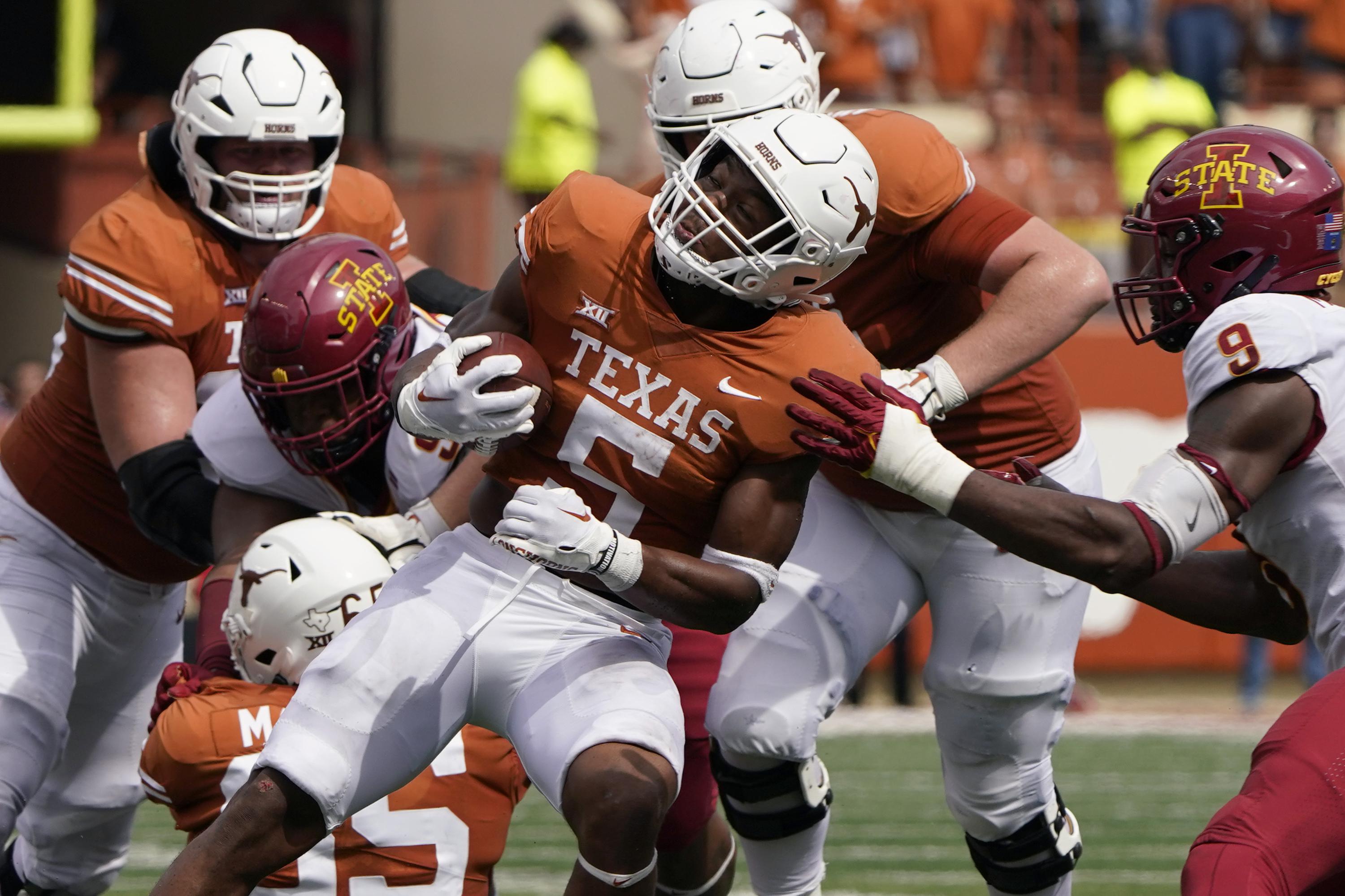 No. 20 Texas wants to keep momentum vs. No. 11 Oklahoma St. | AP News
