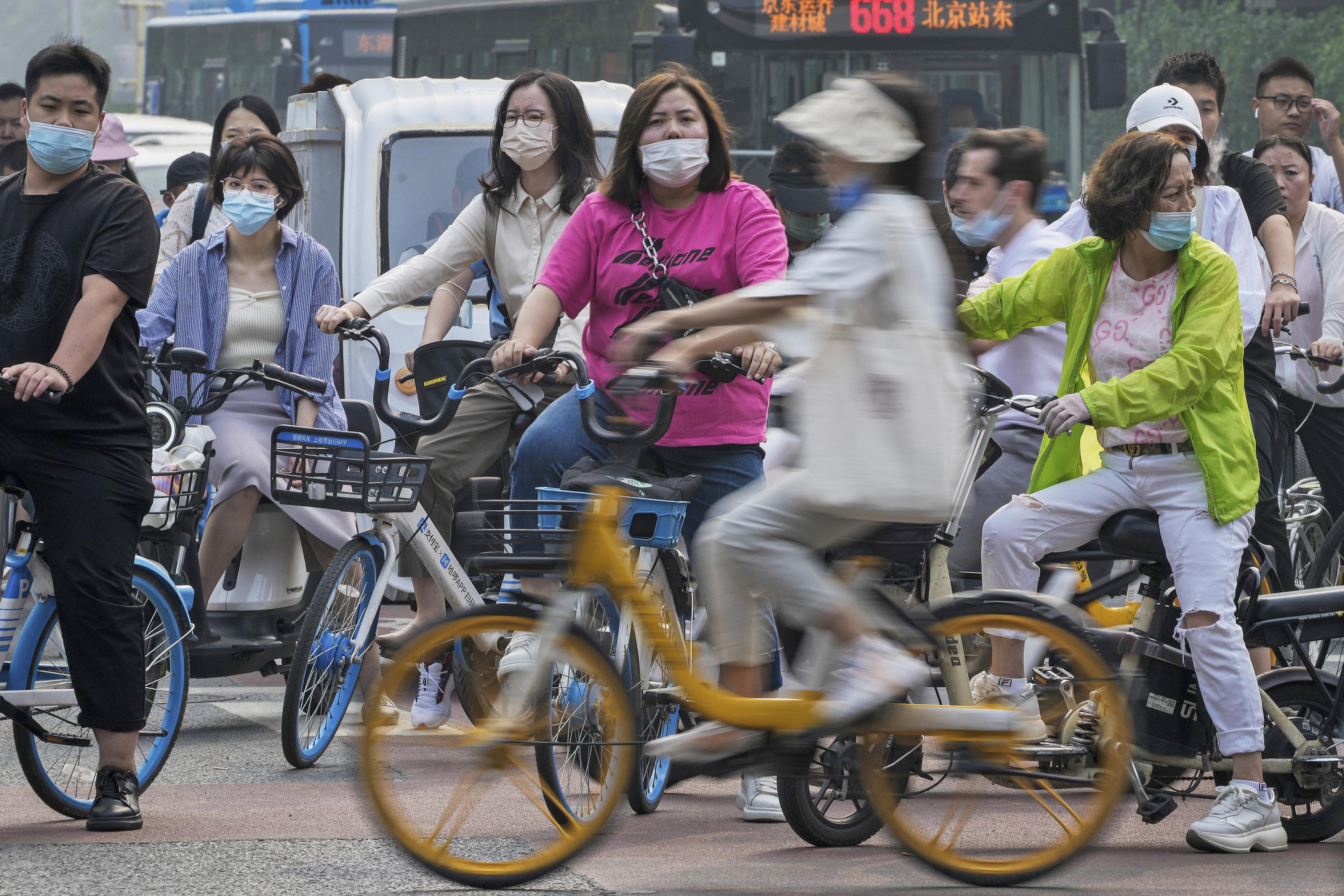 China's consumer, factory activity improve but still weak | AP News