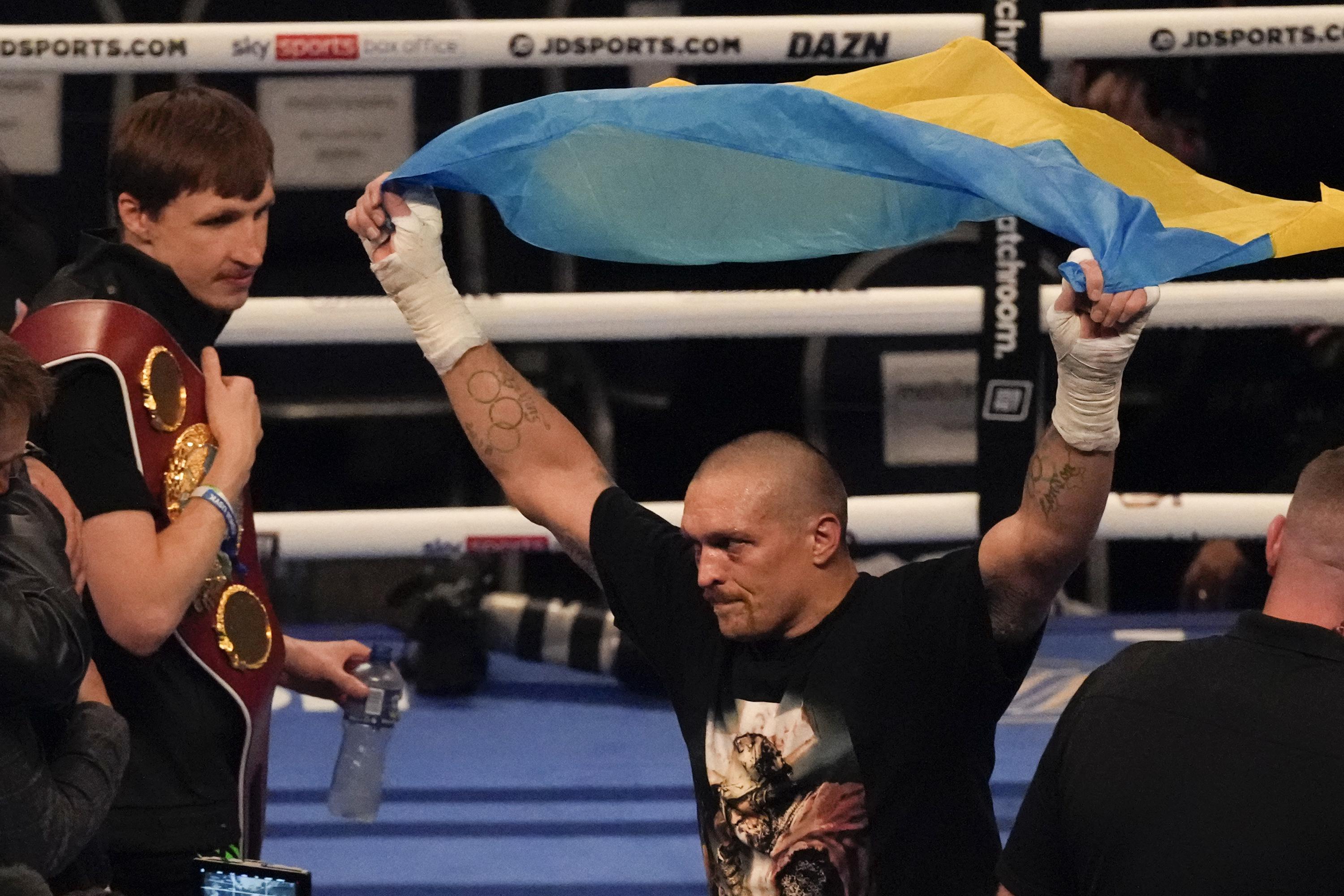 Usyk leaves Ukraine, preparing for rematch with Joshua | AP News