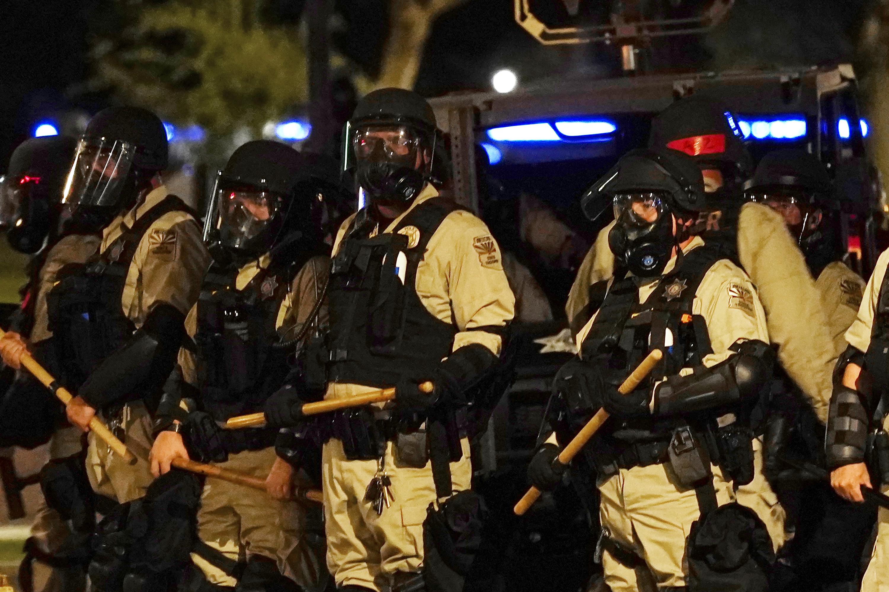 Dueling narratives of Arizona protests ended with tear gas | AP News