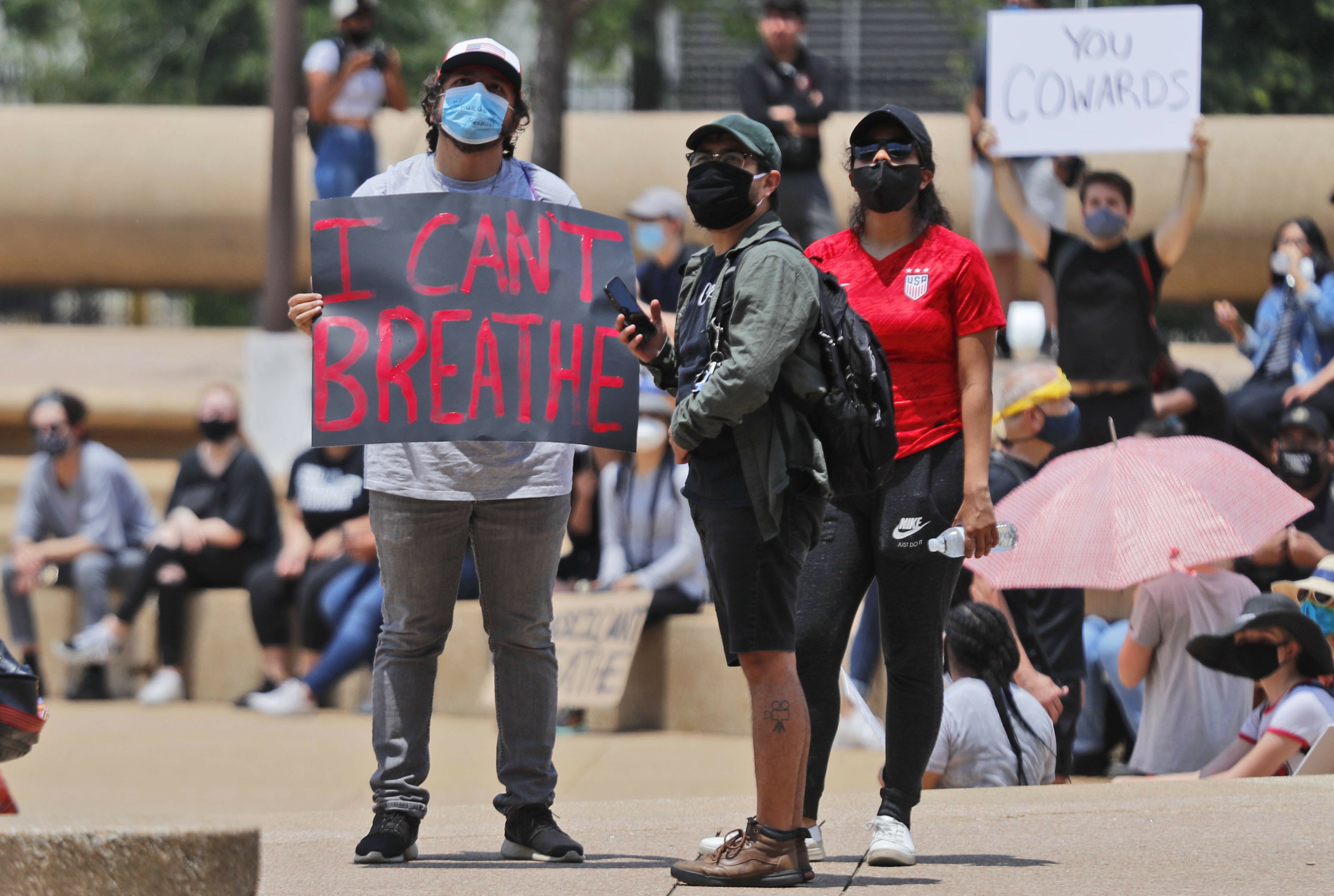 Floyd family members join 60,000 protesters at Houston rally | AP News