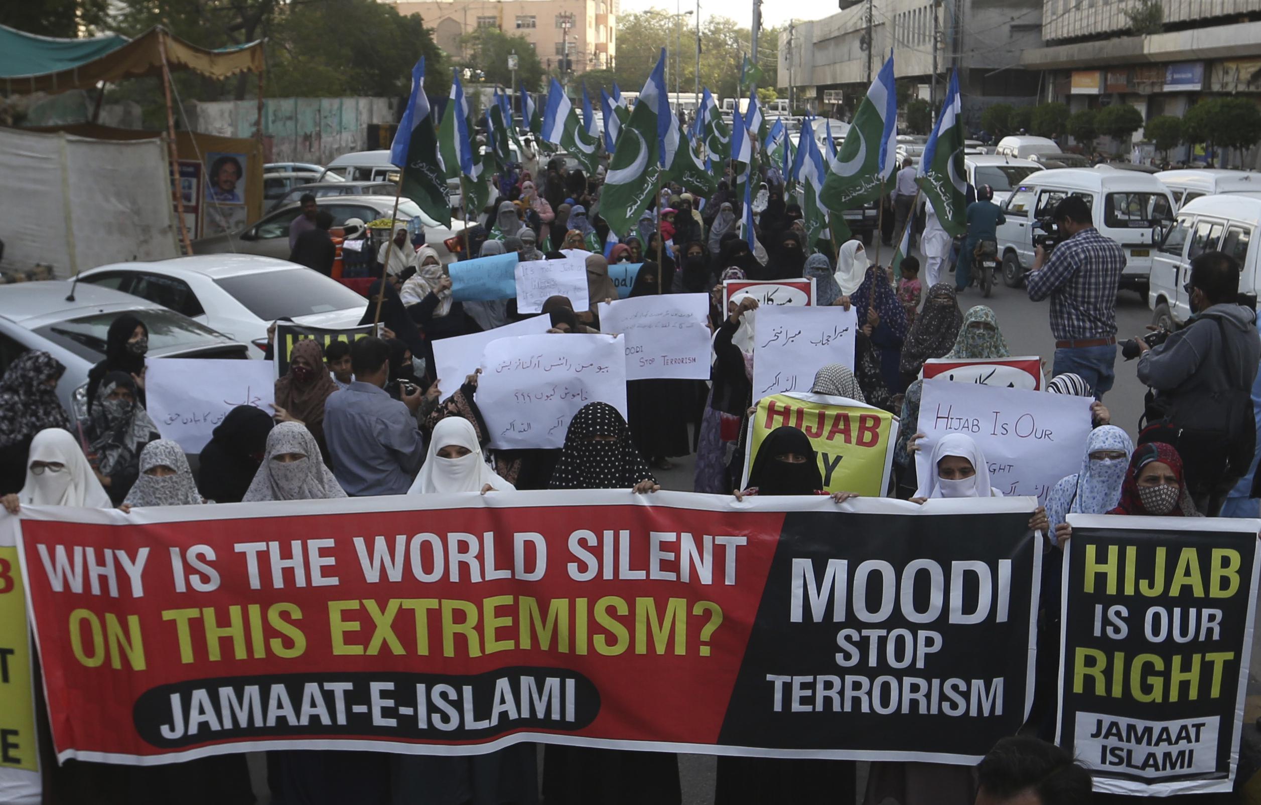 Pakistan women protest India's ban on headscarves in schools | AP News