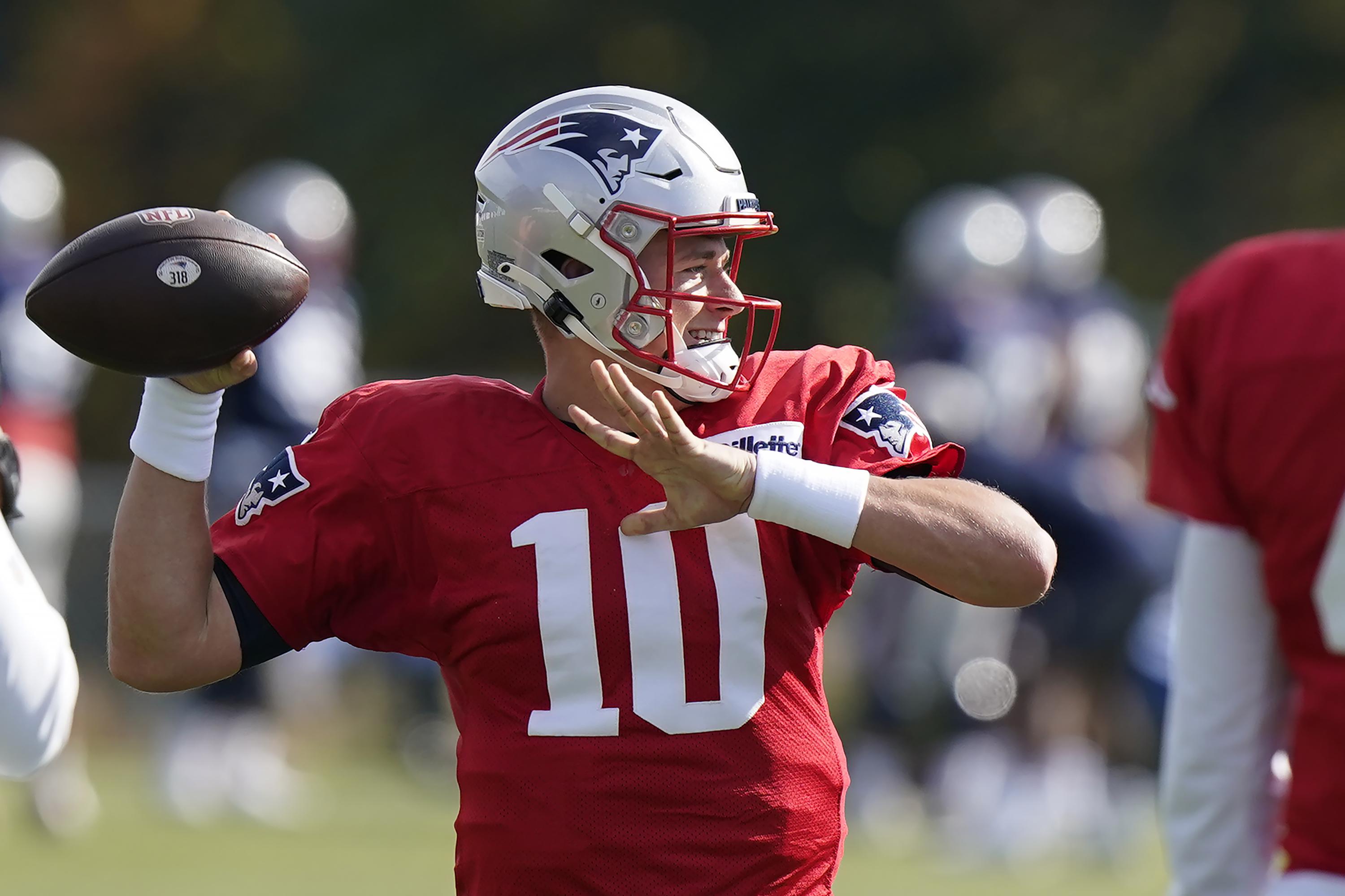 Jones, Wilson growing up fast heading into Pats-Jets rematch | AP News