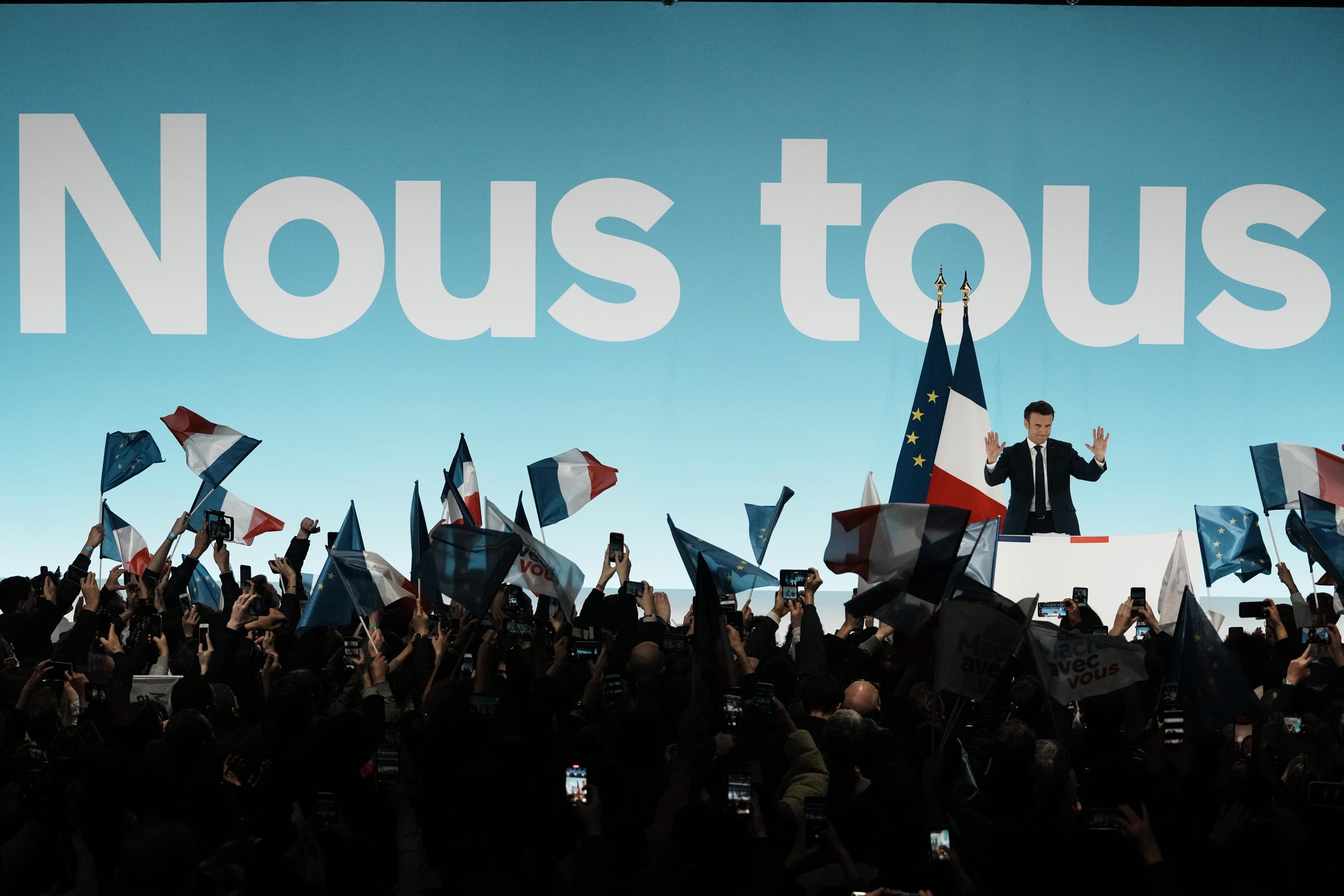 Beer flows, Champagne bubbles as Macron, Le Pen reach final | AP News
