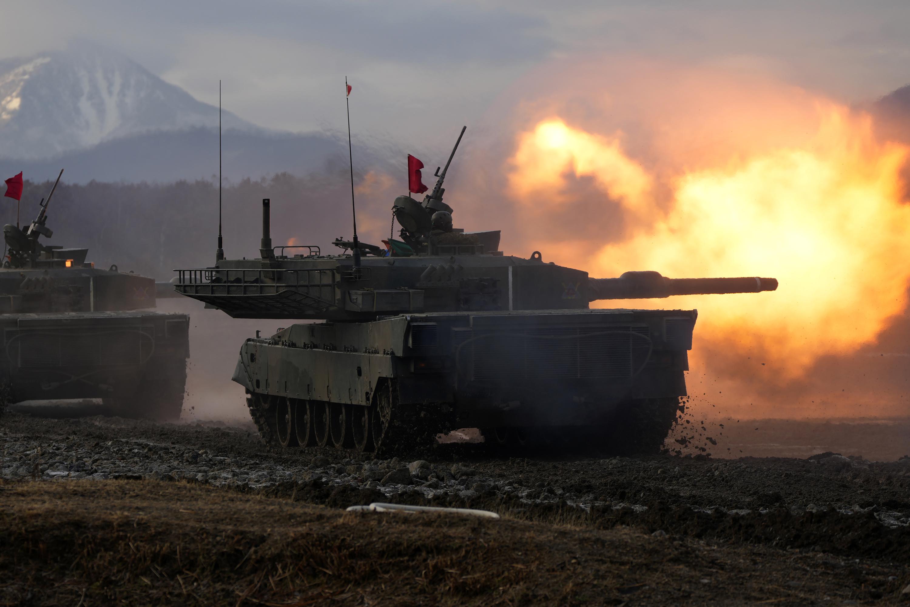 Japan warns of rising global tension, Russia-China arms ties | AP News