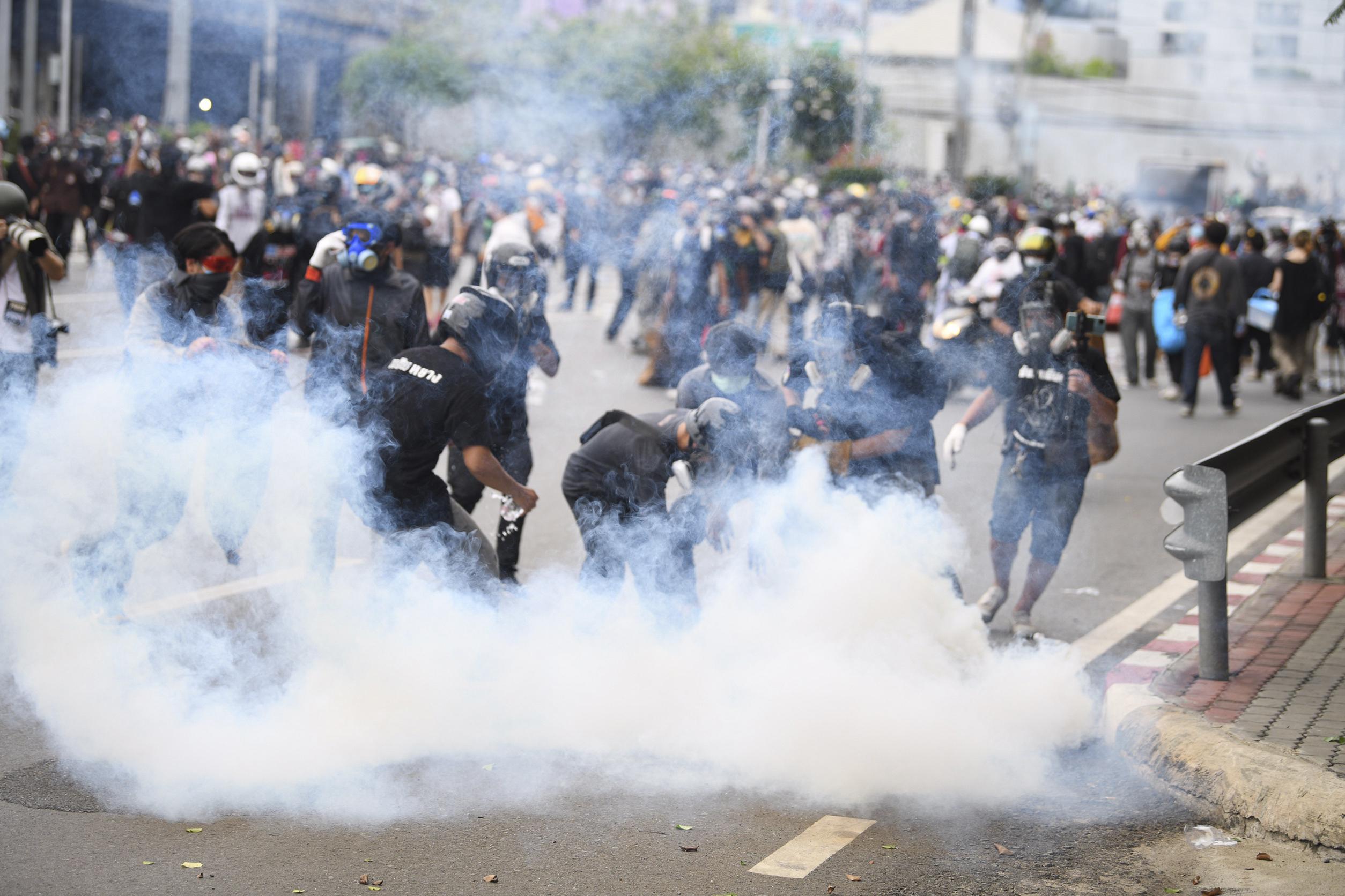 Thai police fire rubber bullets, tear gas at protesters | AP News