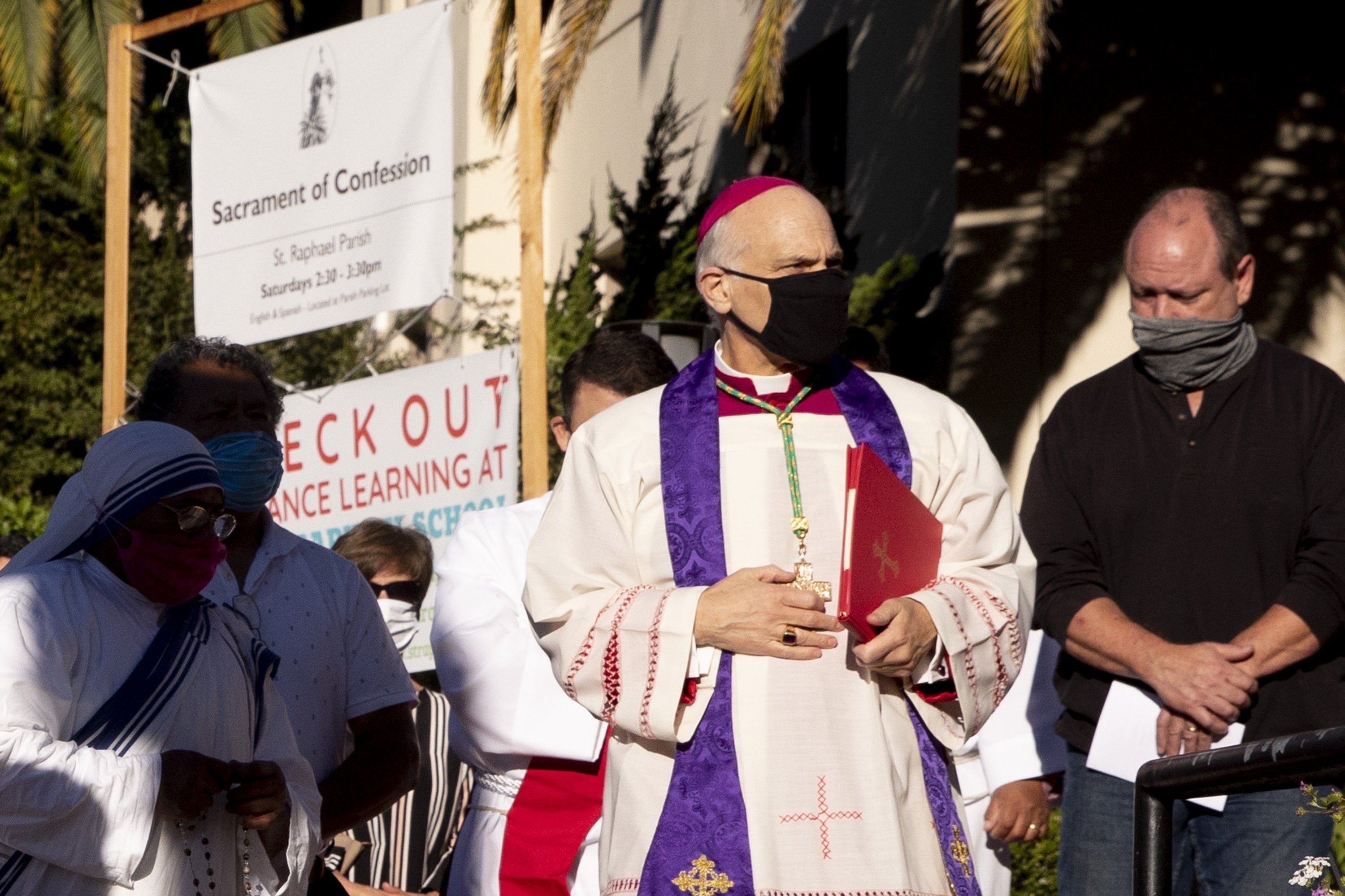 Archbishop performs exorcism to cleanse protest site | AP News