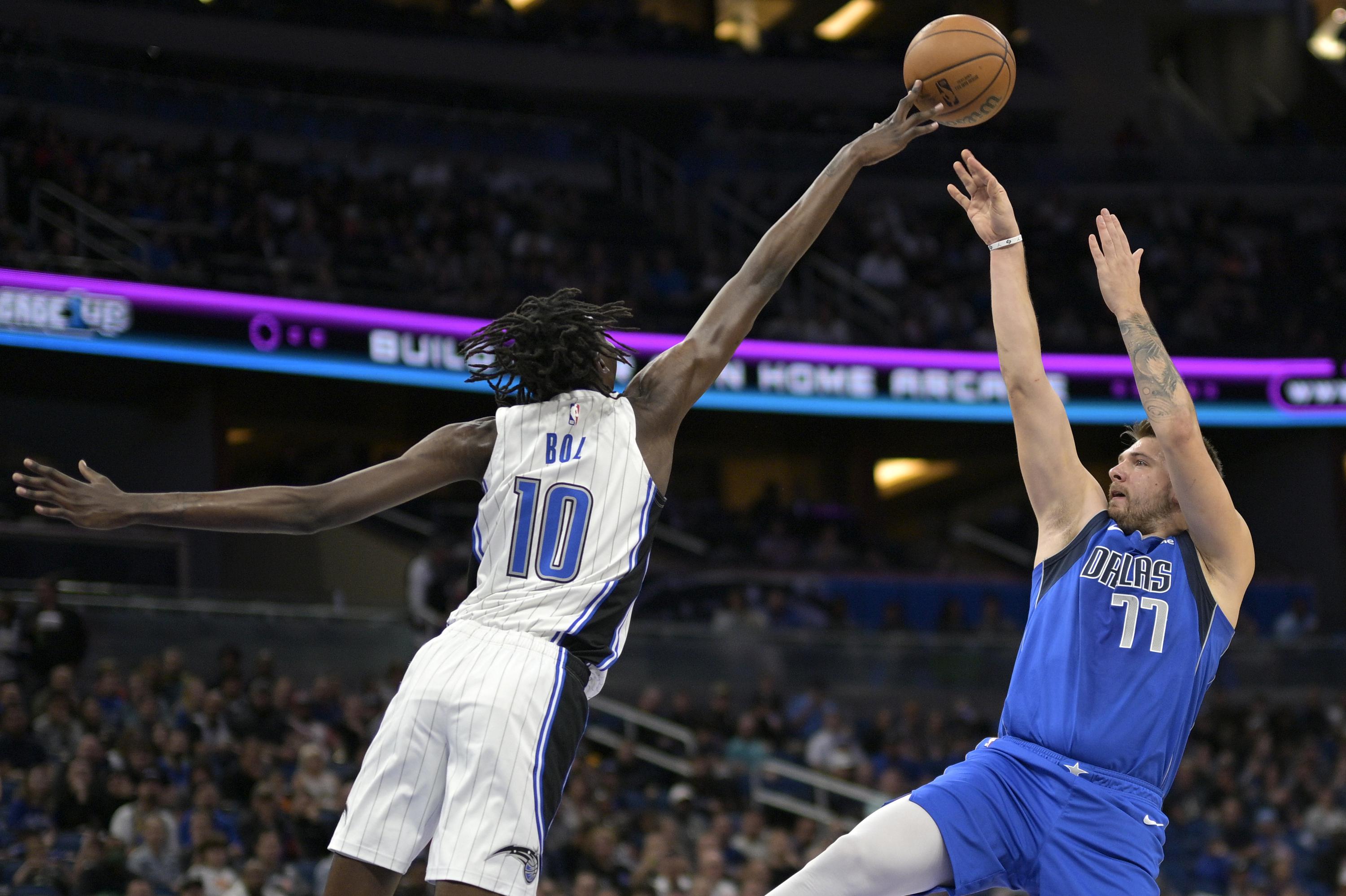 Magic limit Luka Doncic to 24 points, beat Mavericks 94-87 | AP News