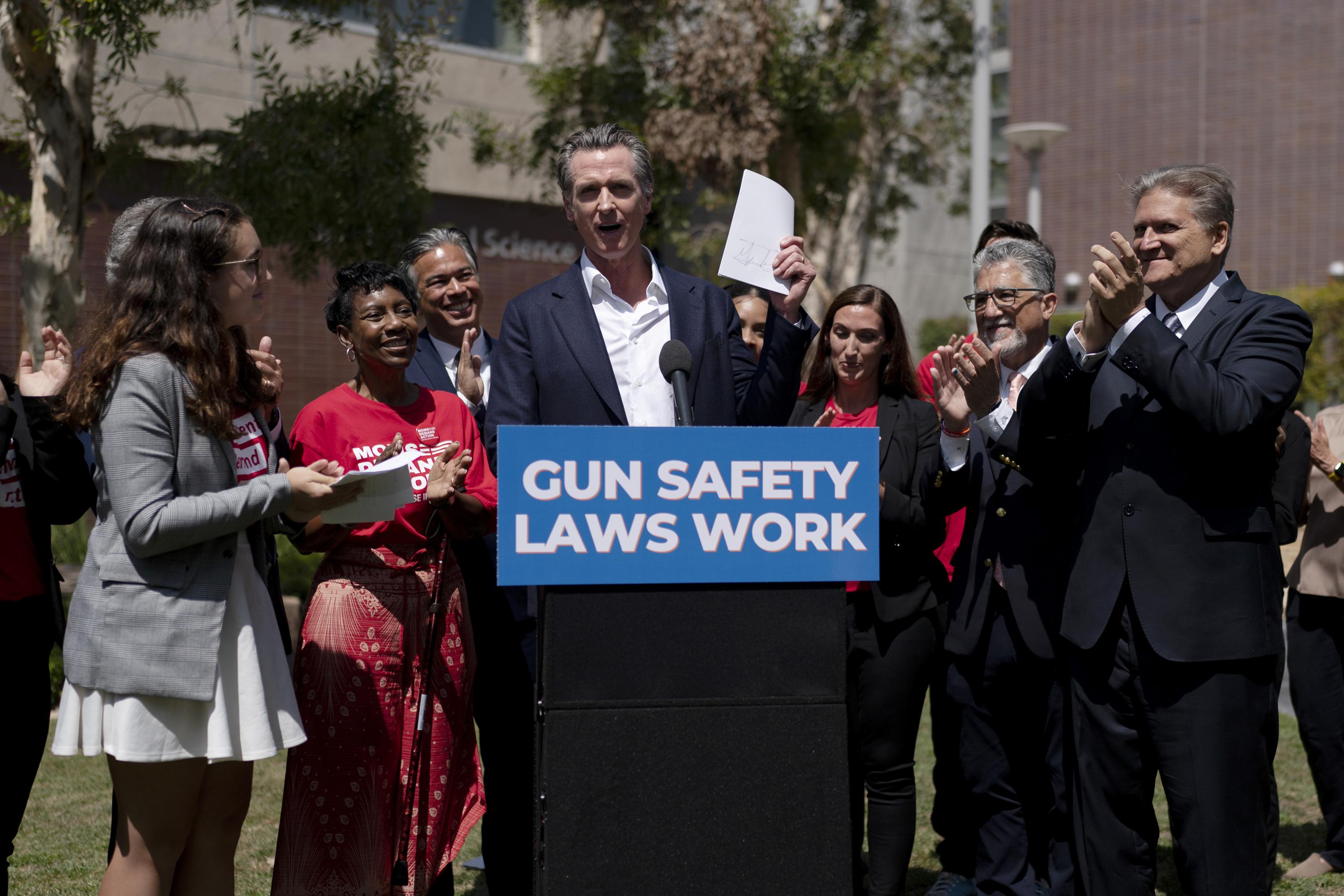 New California gun control law mimics Texas abortion measure | AP News