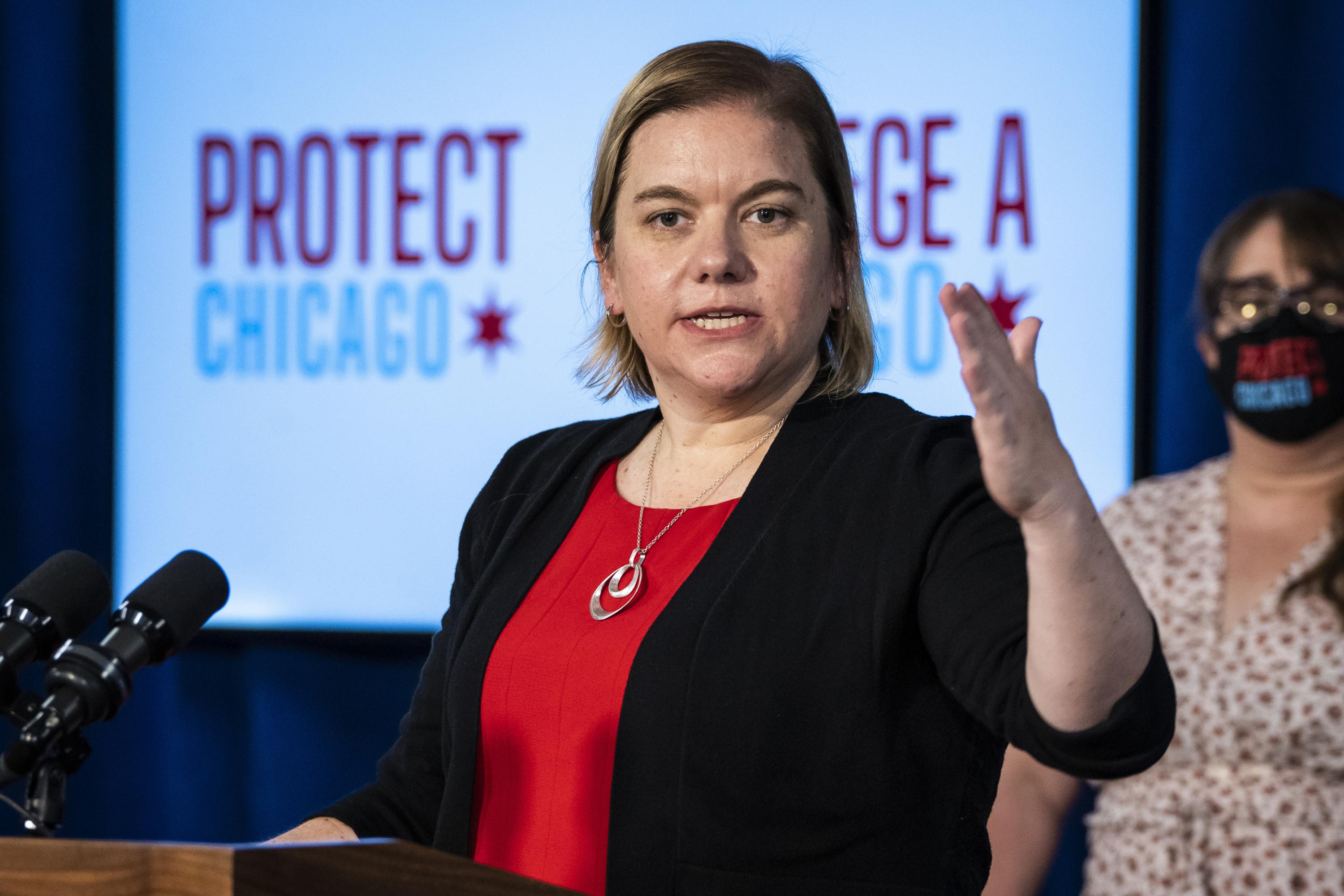 Chicago to require indoor masks for all as COVID cases surge | AP News