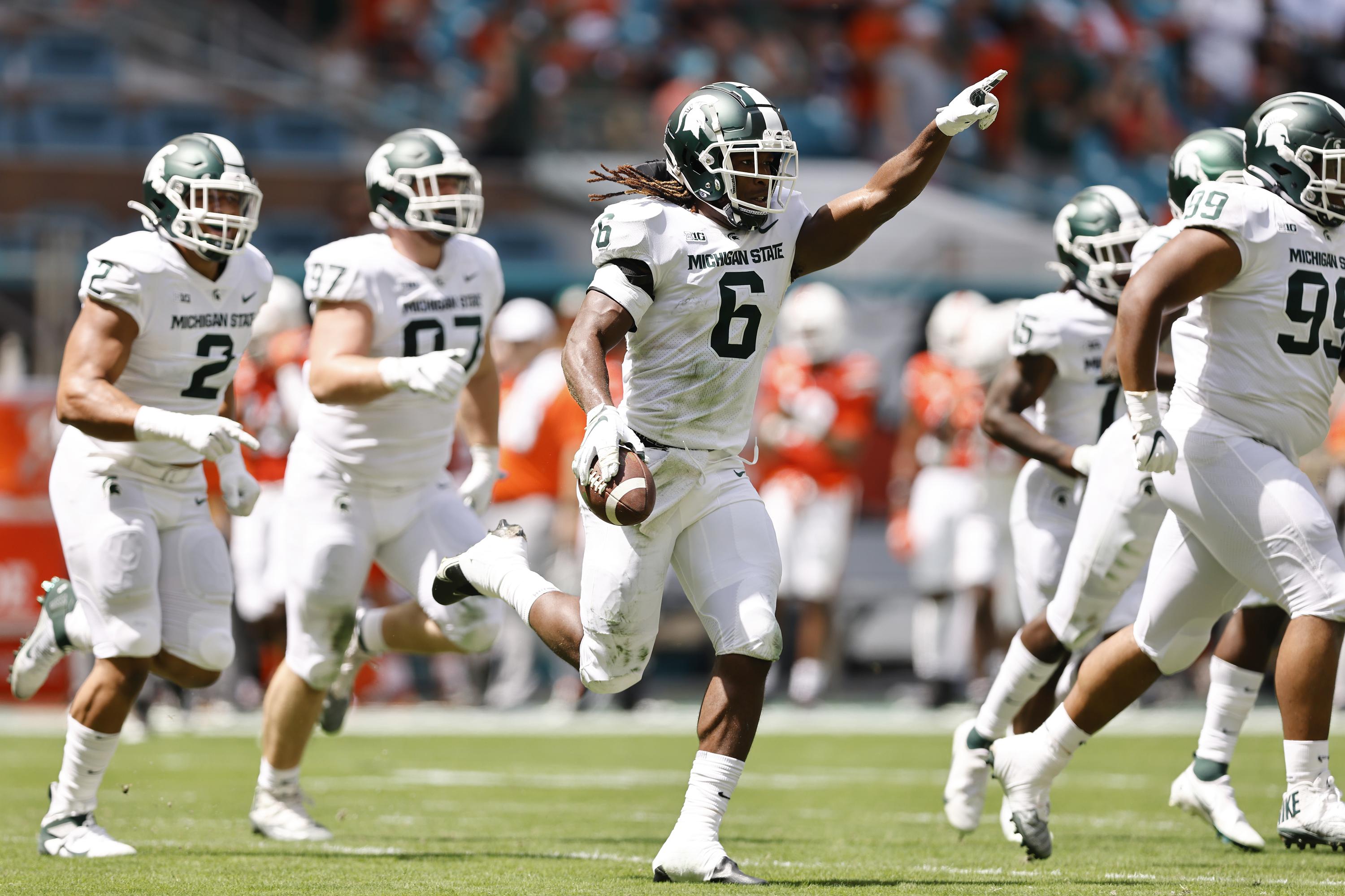 Spartans run: Michigan State rolls past No. 24 Miami, 38-17 | AP News