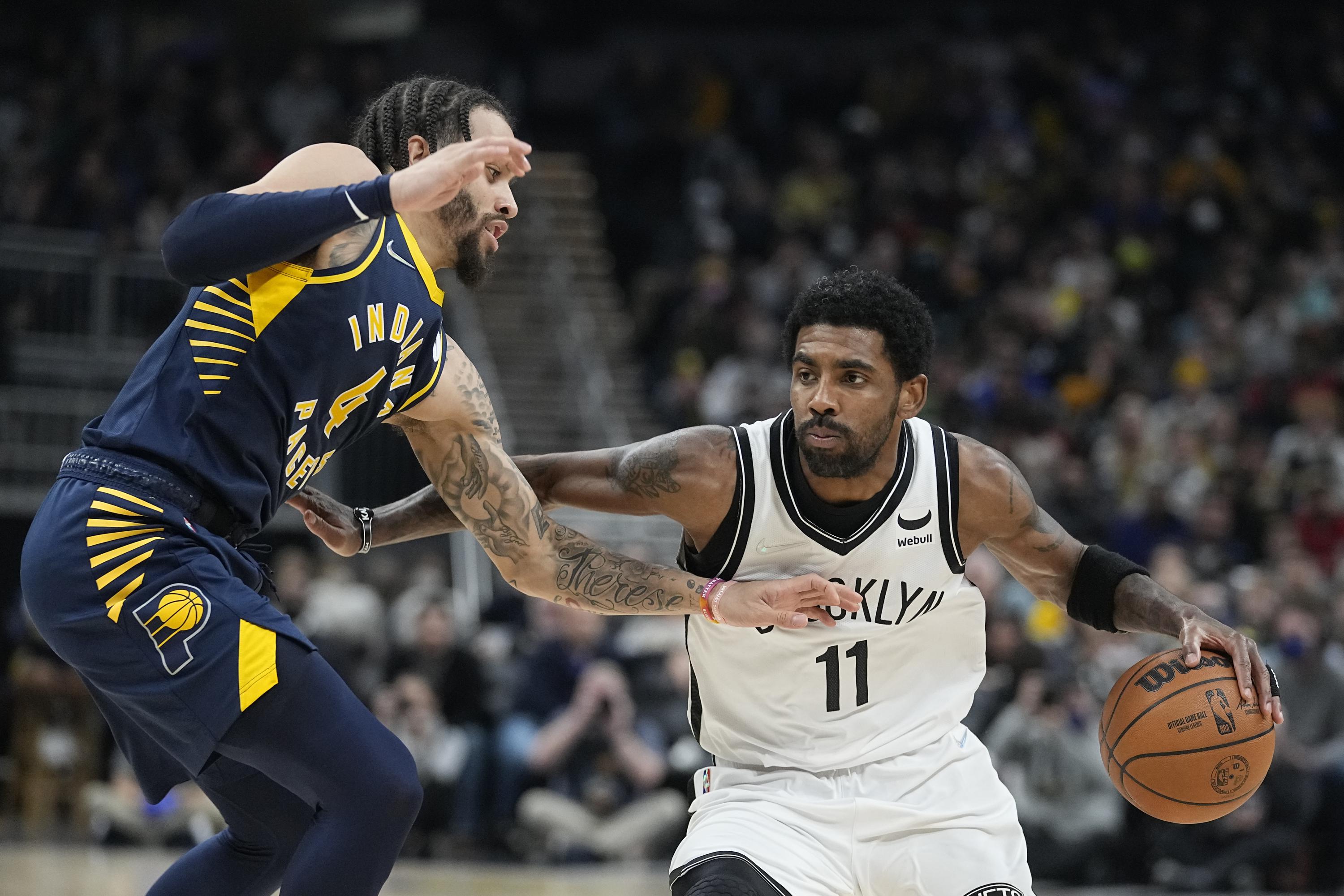 Still no vax, Kyrie's back: Star guard lifts Nets in debut | AP News