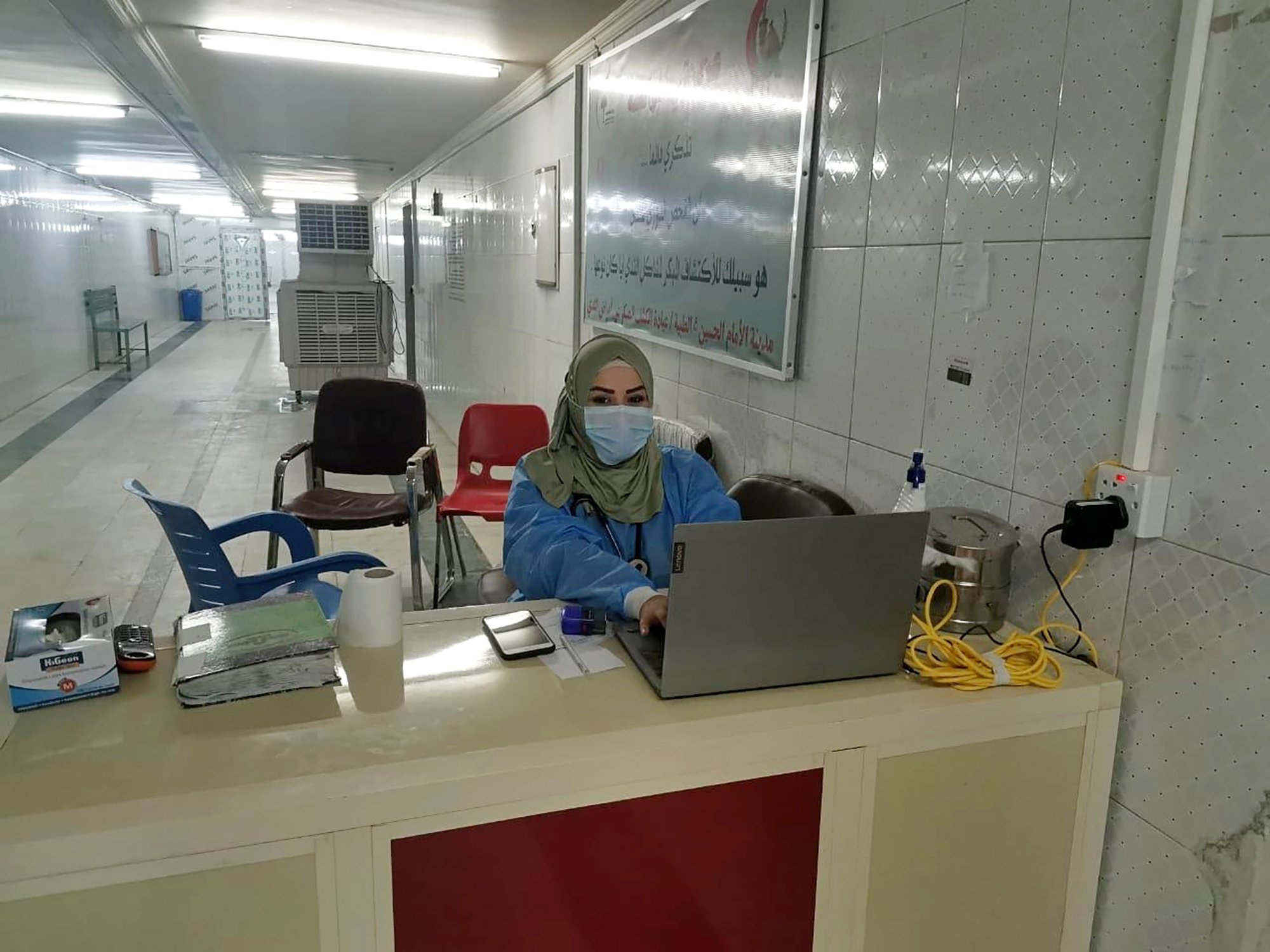 Iraqi doctor's fight with virus lays bare a battered system | AP News