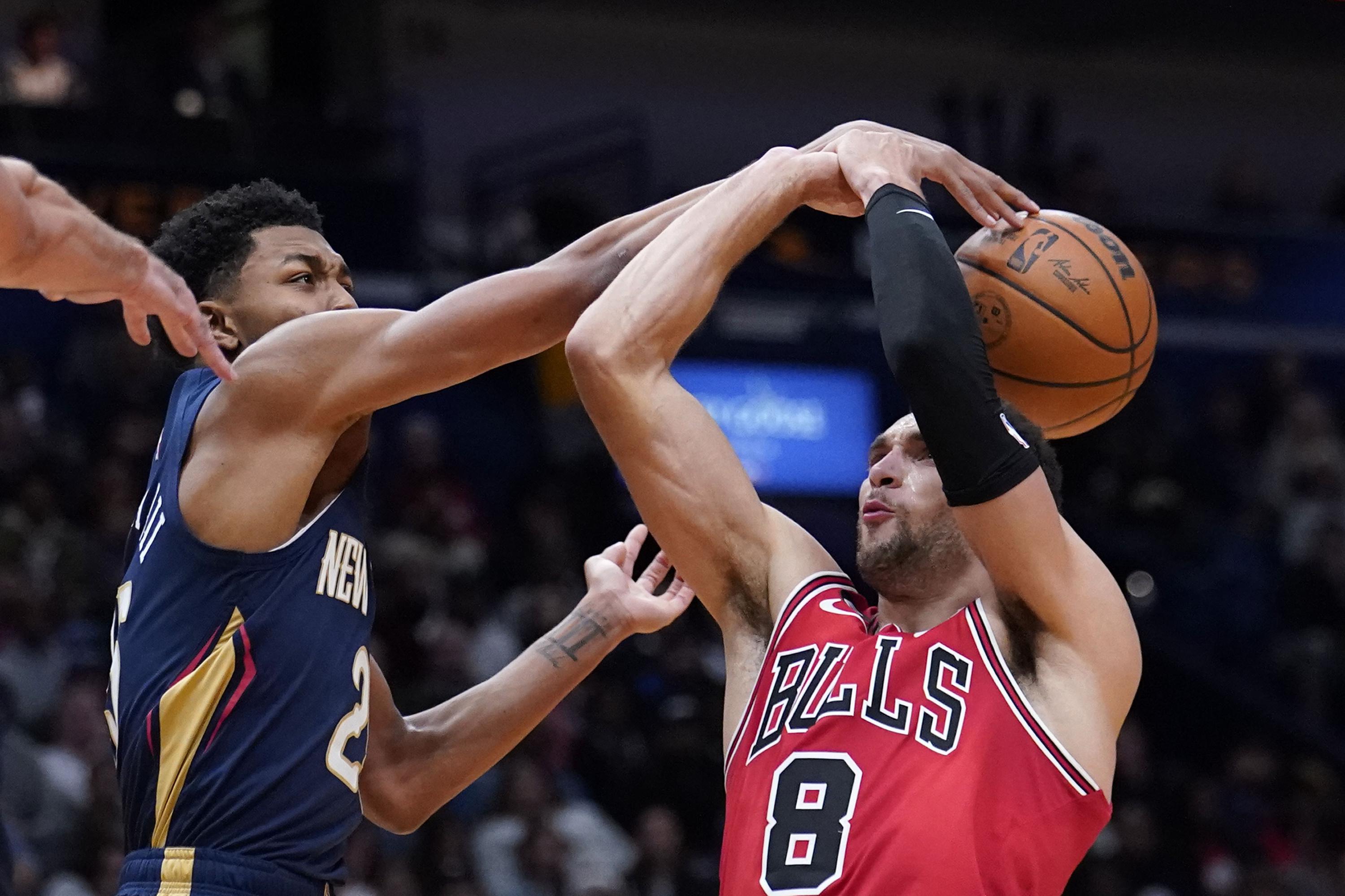 Pelicans superan 124-110 a Bulls, McCollum anota 23 puntos | AP News