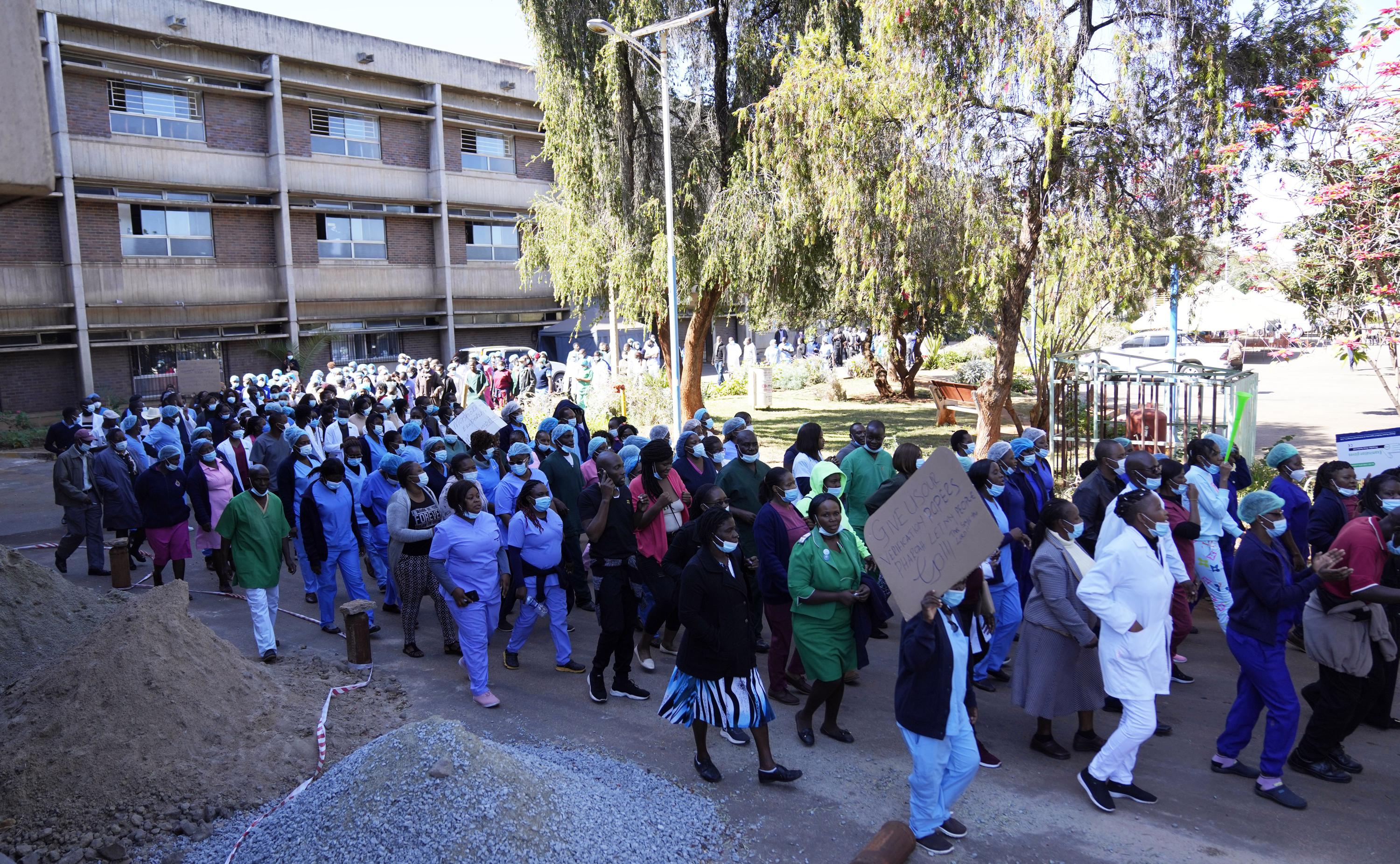 Nurses at Zimbabwe's public hospitals strike for better pay | AP News
